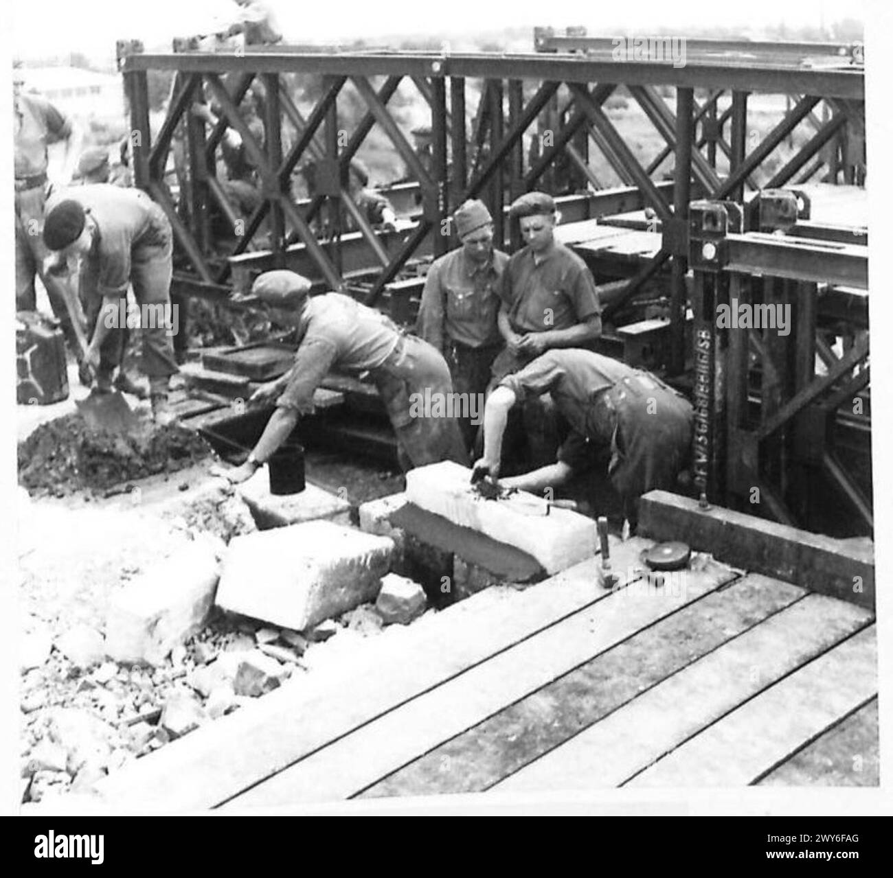 THE BAILEY BRIDGE IN FRANCE - Building the road level up to the level ...