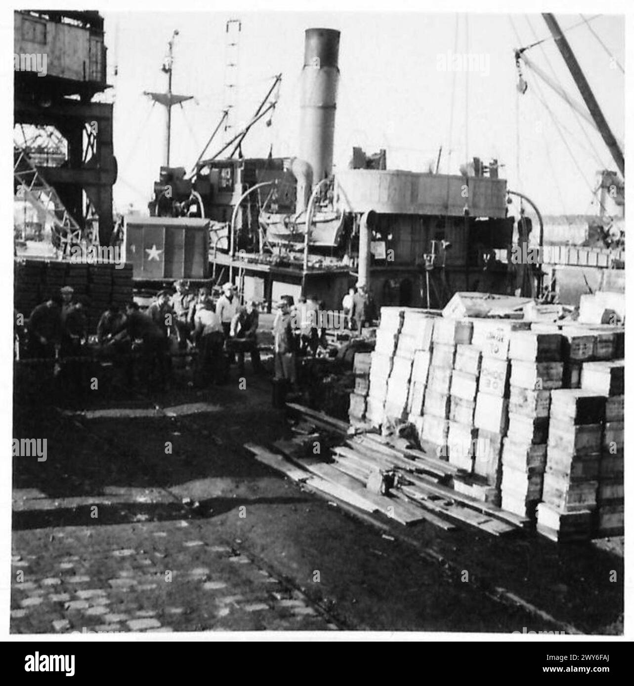 DIEPPE. - Unloading German petrol cans containing fuel for our ...