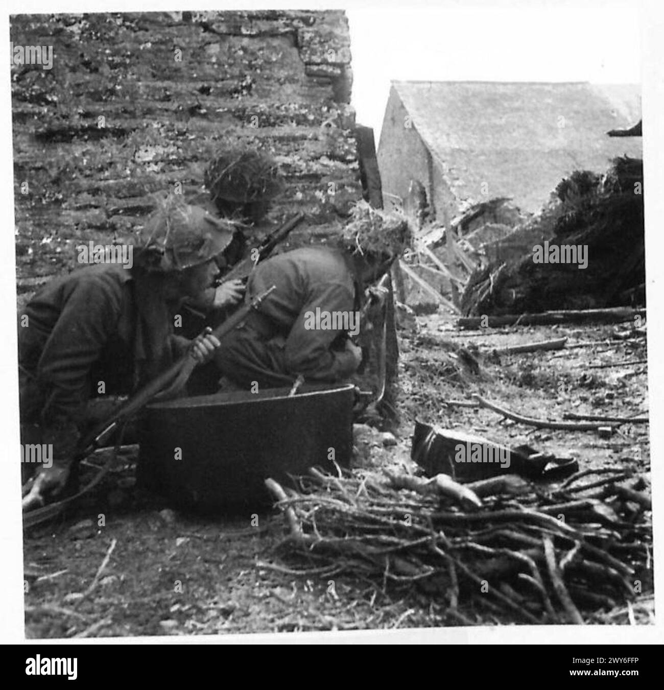 A sniper-clearing party observes a farmhouse and identifies the window ...