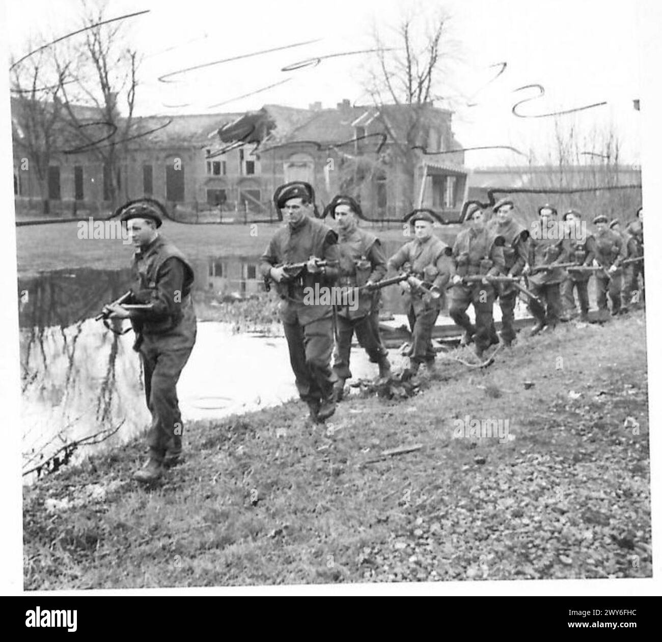 Koyli troops patrol the flooded front line in the village of Elst ...