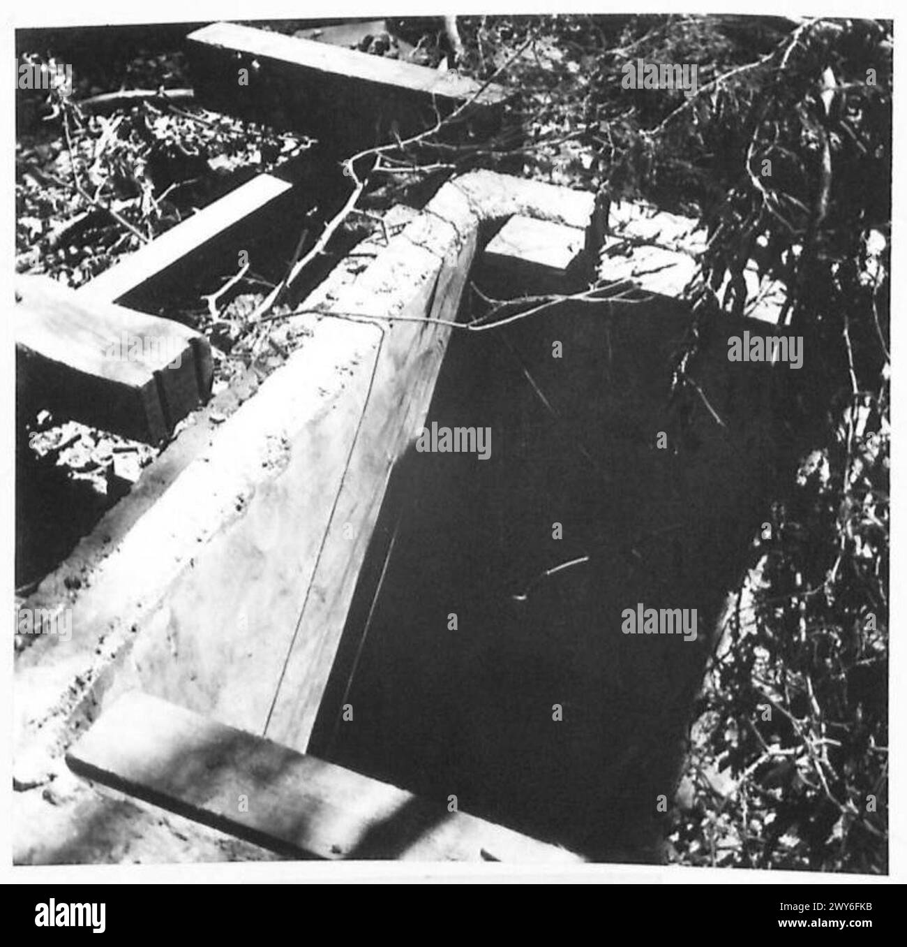 WRECKED FLYING BOMB SITES - One of the wells at a flying bomb site ...