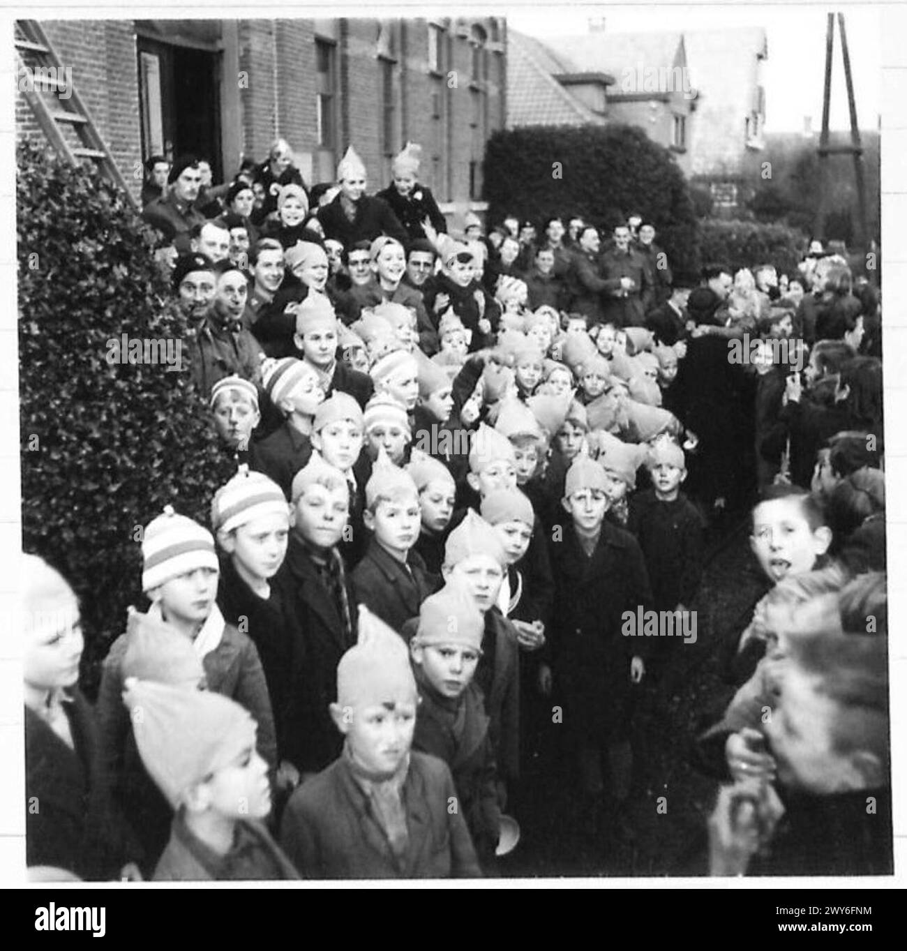 BRITISH TROOPS ENTERTAIN DUTCH CHILDREN - Kiddies arrayed in their best ...