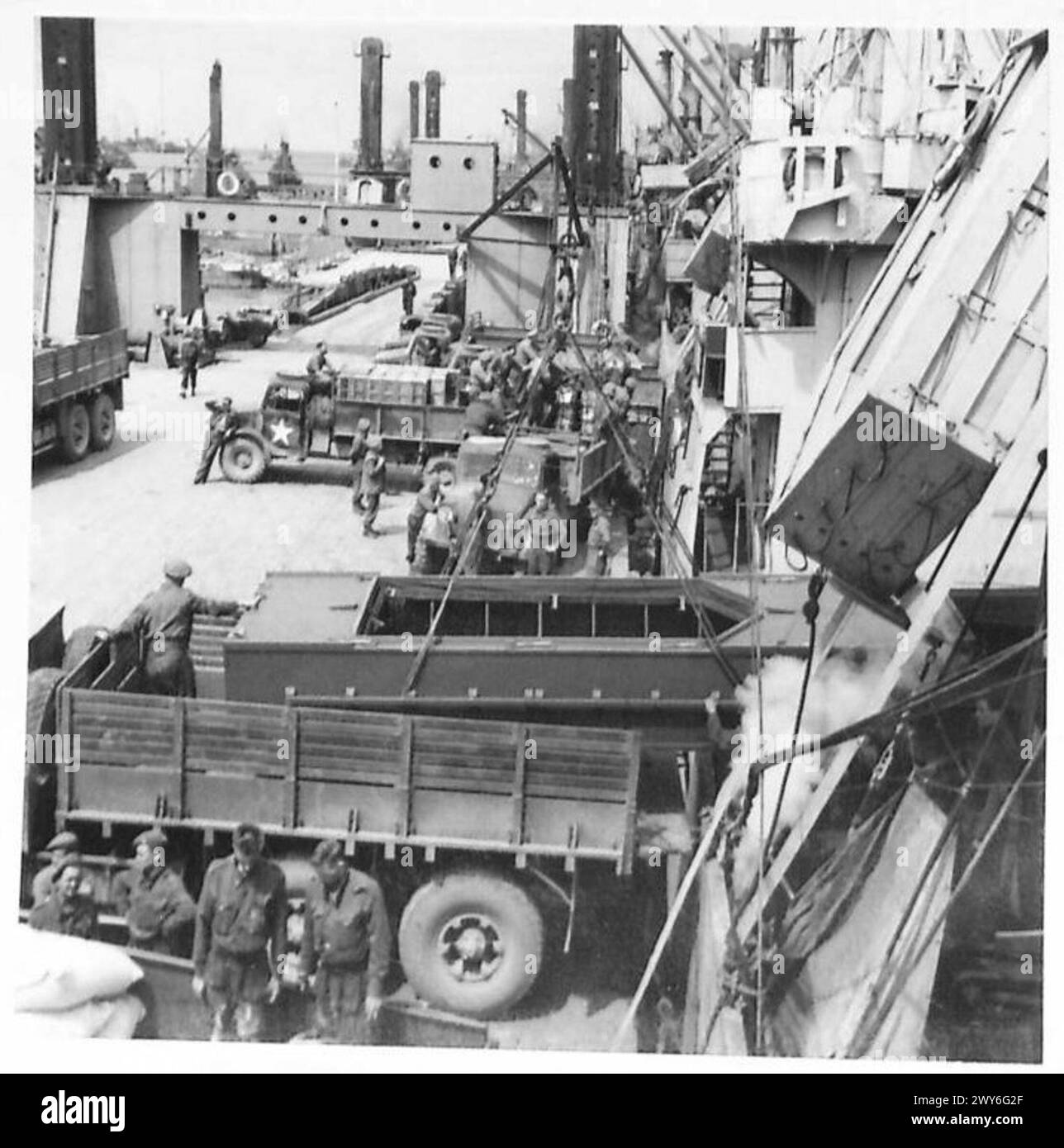 SPECIAL ASSIGNMENT FOR TN5 - Showing berths and ships unloading at Mulberry B. , British Army ...