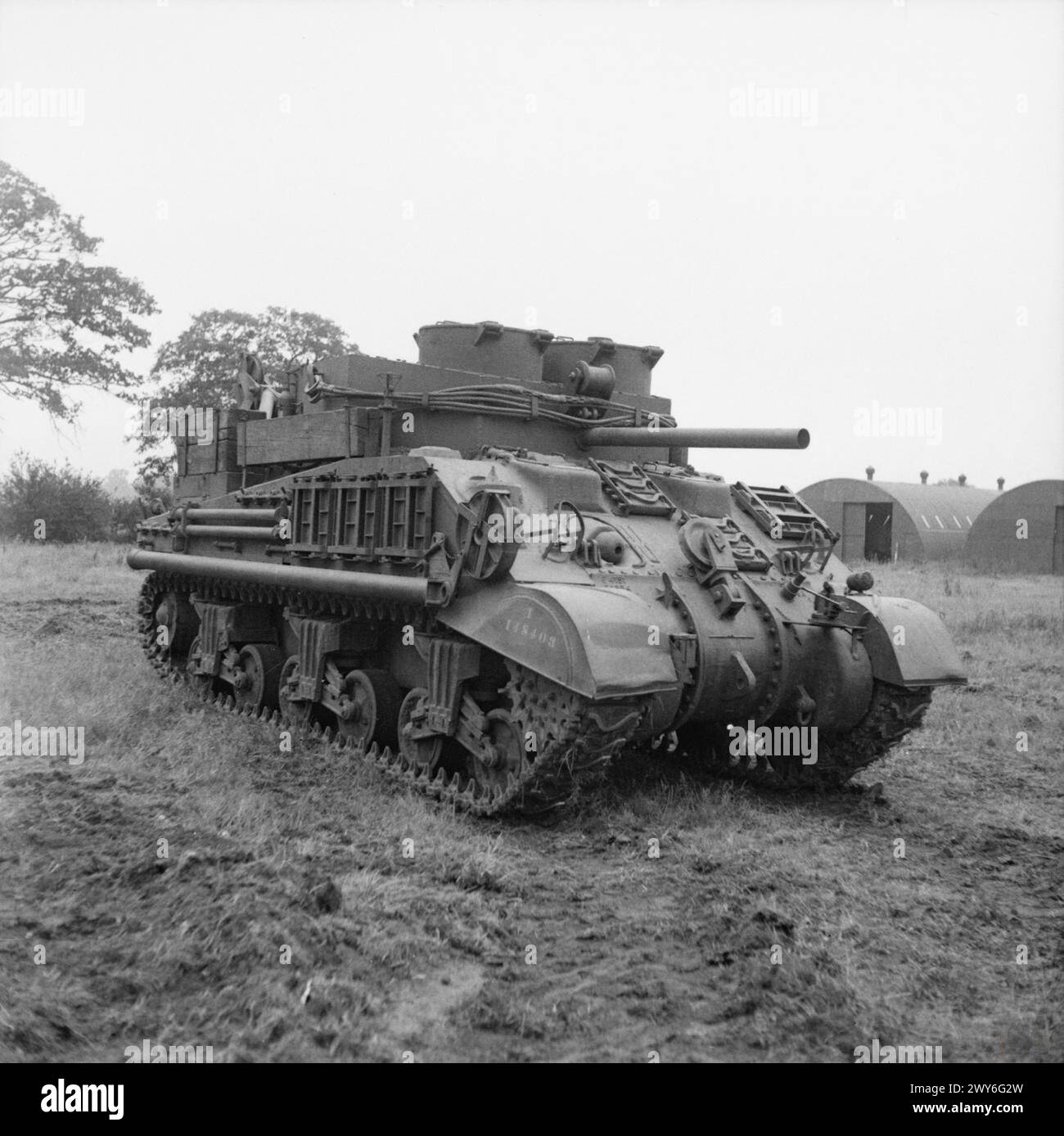 The Sherman ARV Mk II armored recovery vehicle is shown in use by the ...