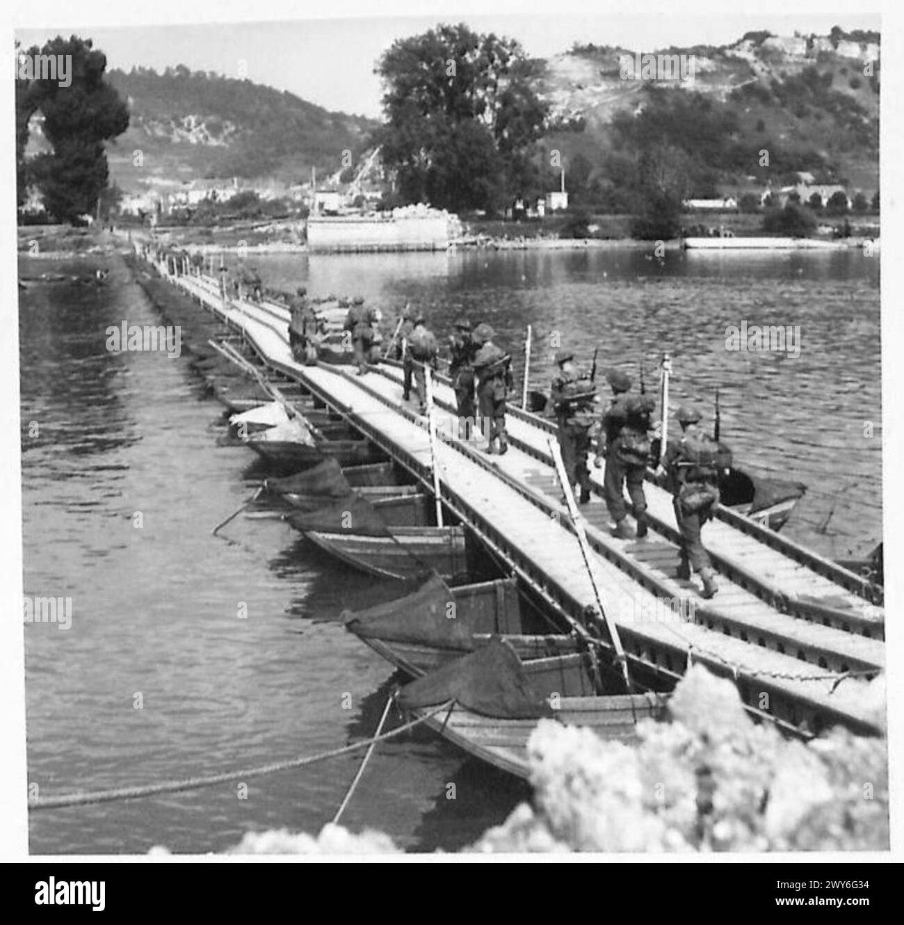 CROSSING THE SEINE BRIDGES - The Hampshire Regt. crossing the River ...