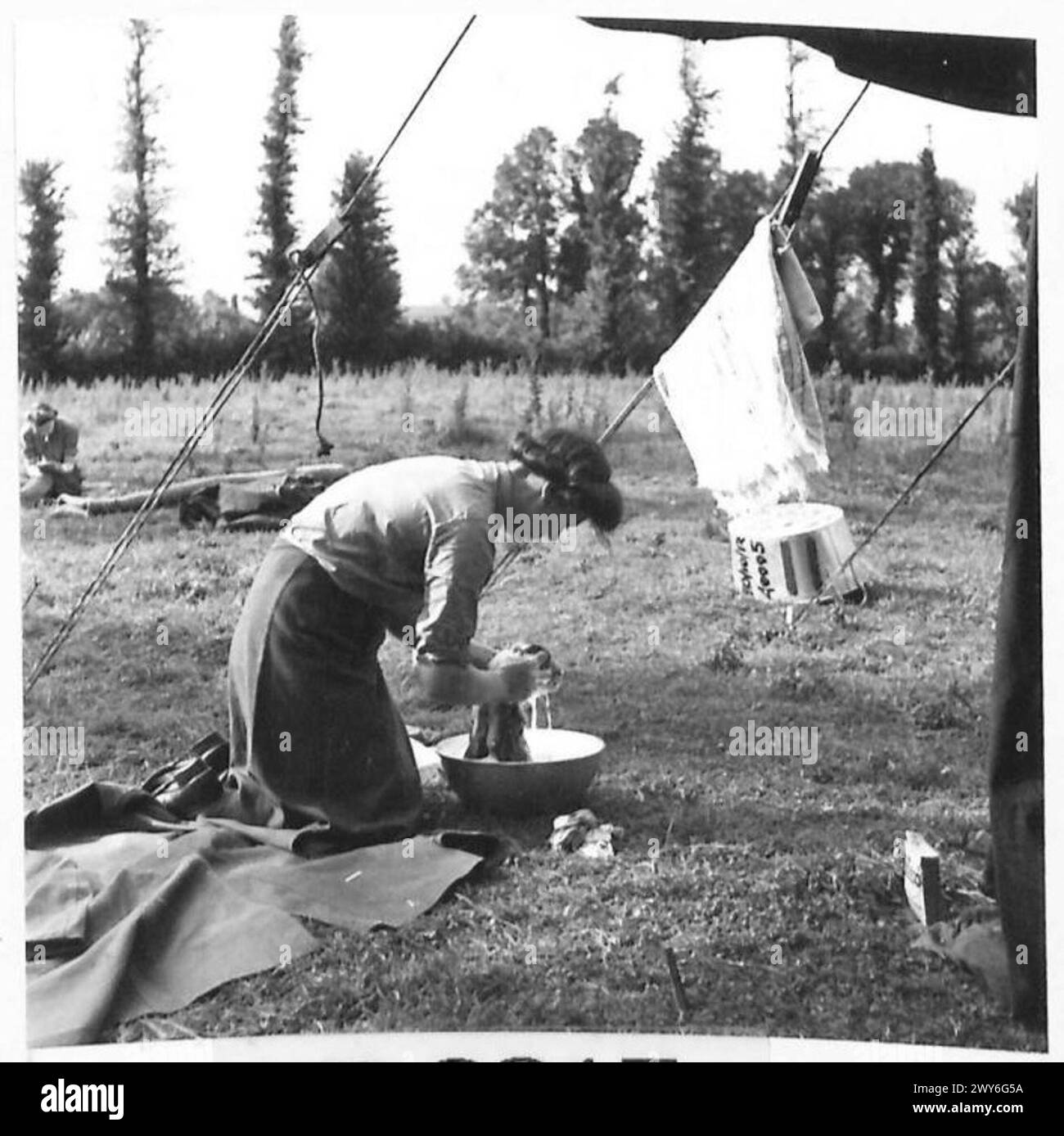 THE FIRST ATS IN NORMANDY - L/Cpl. Celia Strong washing garments ...