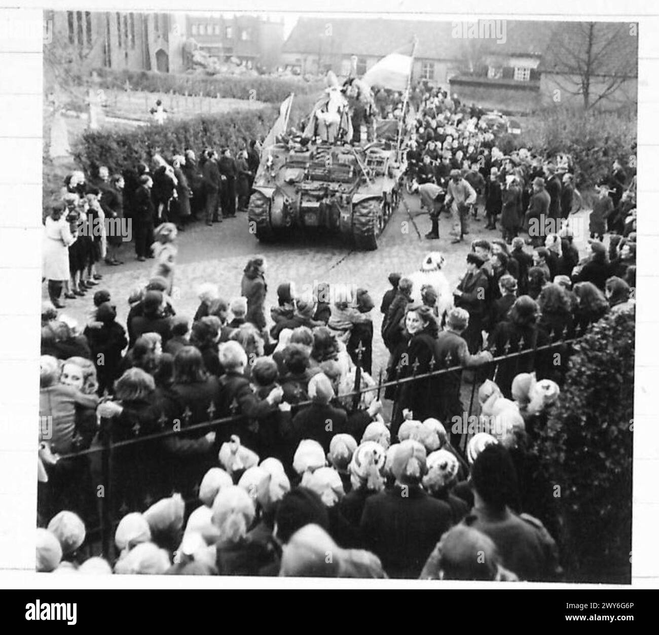 BRITISH TROOPS ENTERTAIN DUTCH CHILDREN - St Nicolas seen arriving in a ...
