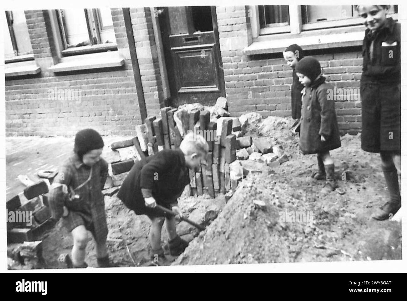 SUNDAY IN S'HERTOGENBOSCH - A group of children amuse themselves by ...