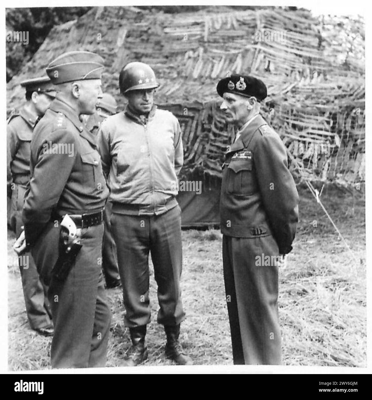 GENERAL MONTGOMERY PRESENTS MEDALS TO AMERICAN OFFICERS - Left to right ...