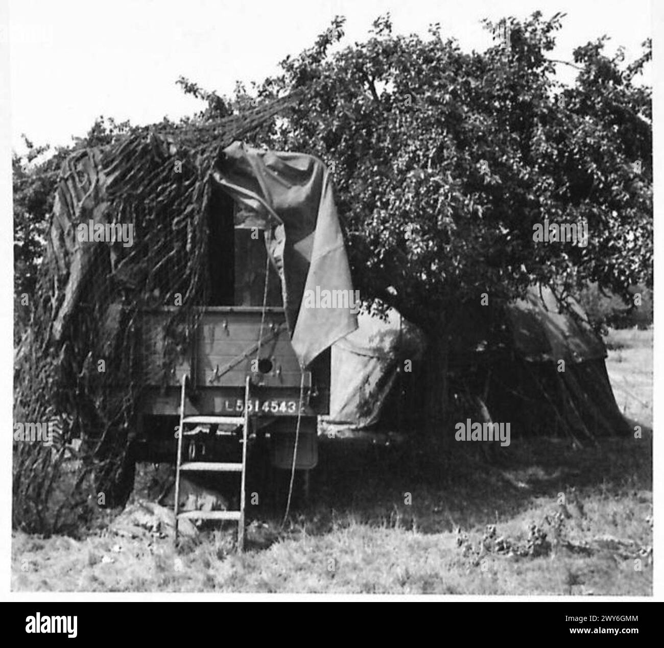 A Corps headquarters in France uses a map lorry with racks for maps and ...