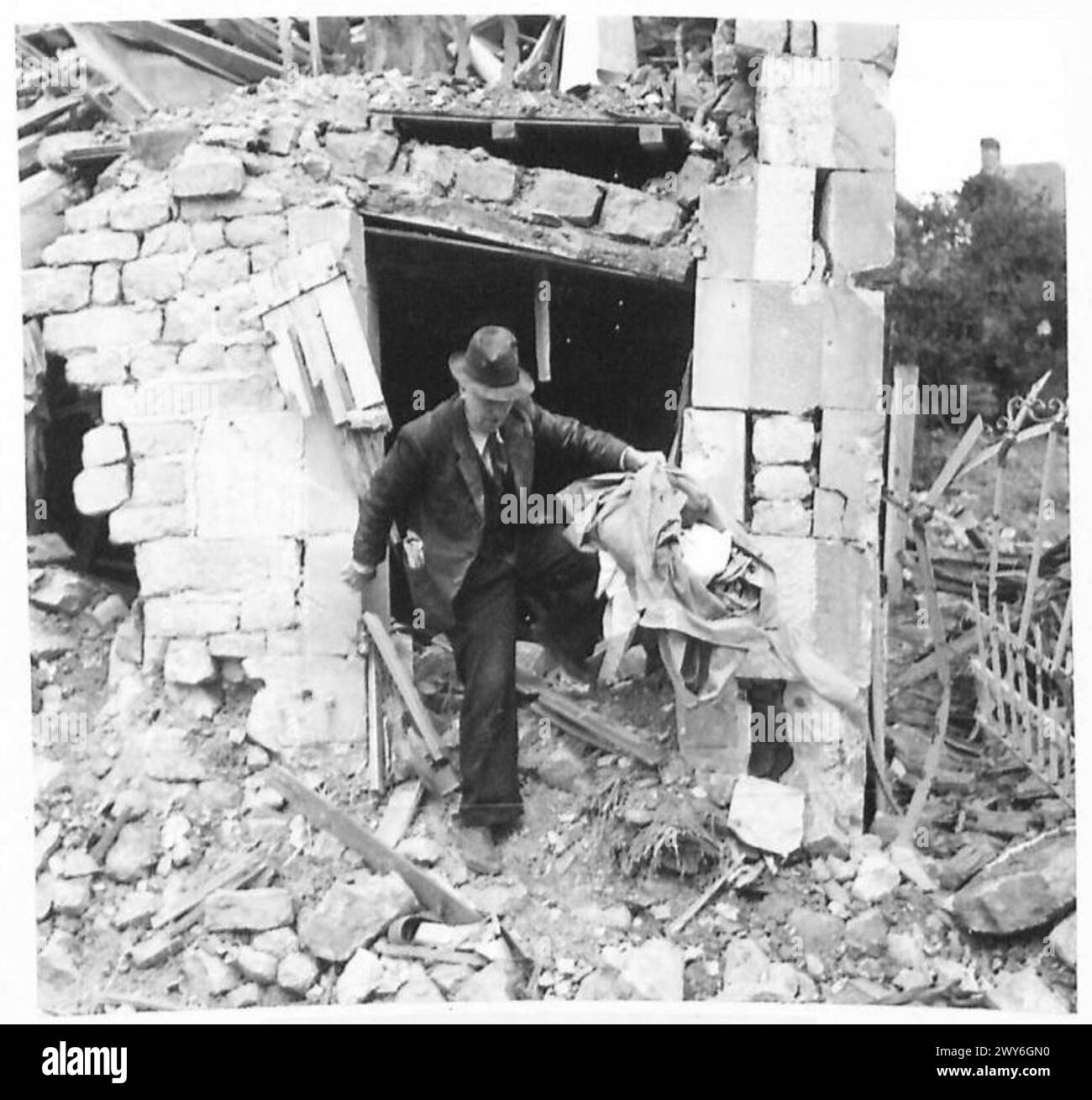 SCENES IN THE RUINS OF TILLY SUR SEULLES - One of the inhabitants of ...