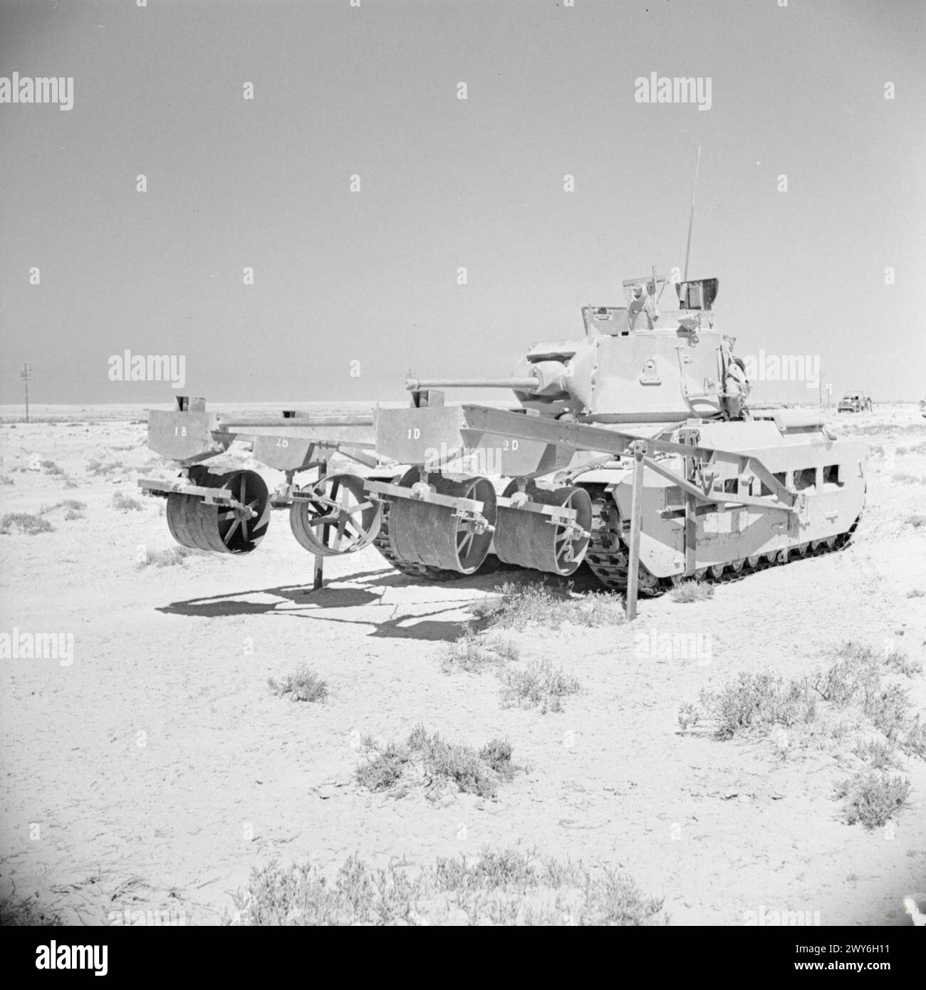 A Matilda tank equipped with an AMRA Mk 1a Anti-Mine Roller Attachment ...