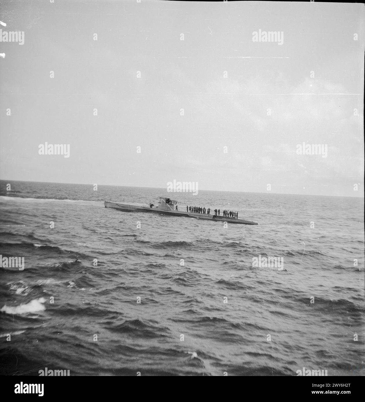 The crew of U-660 abandons the submarine after depth charge attacks by ...