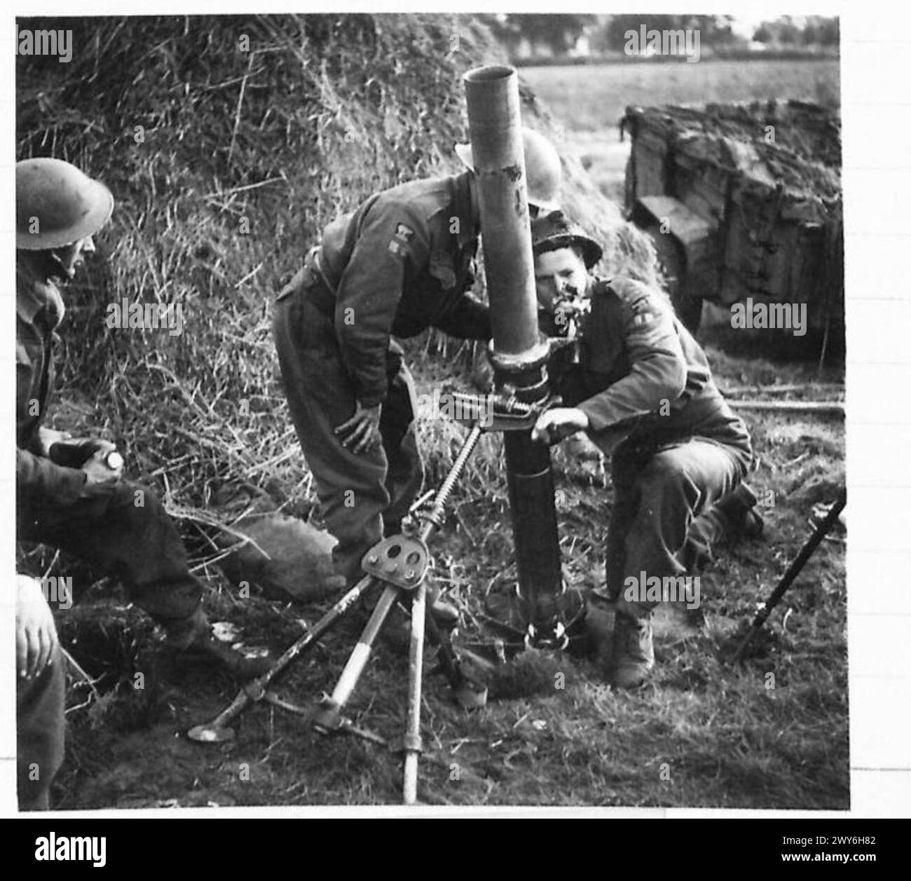 4.2 MORTARS IN ACTION, B.L.A. - Front view: The handle half way up ...