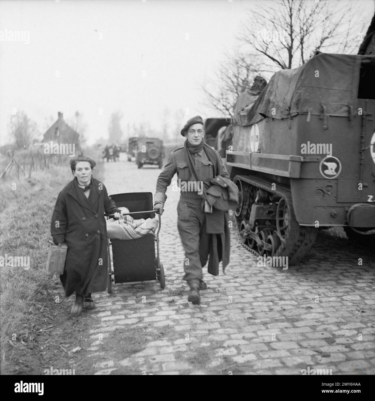 Sapper W.H. Cheeson of 756th Field Company Royal Engineers guides a ...