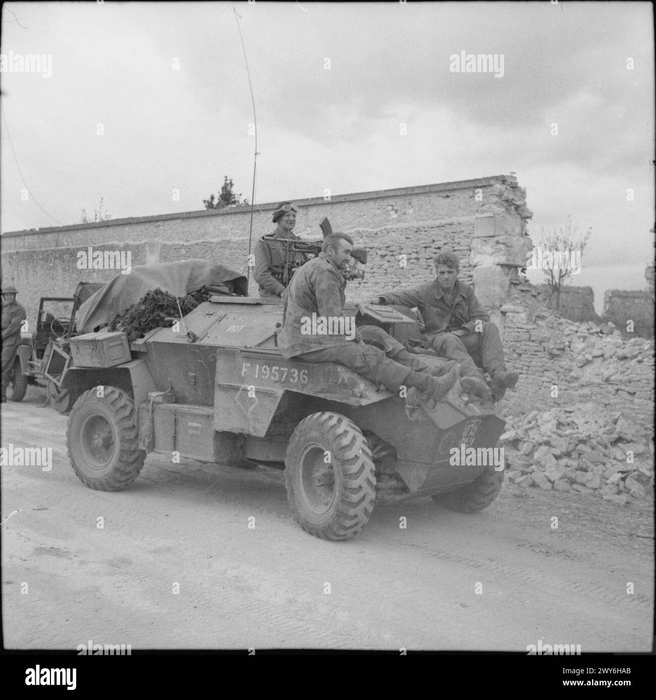 THE BRITISH ARMY IN THE NORMANDY CAMPAIGN 1944 - German prisoners being ...