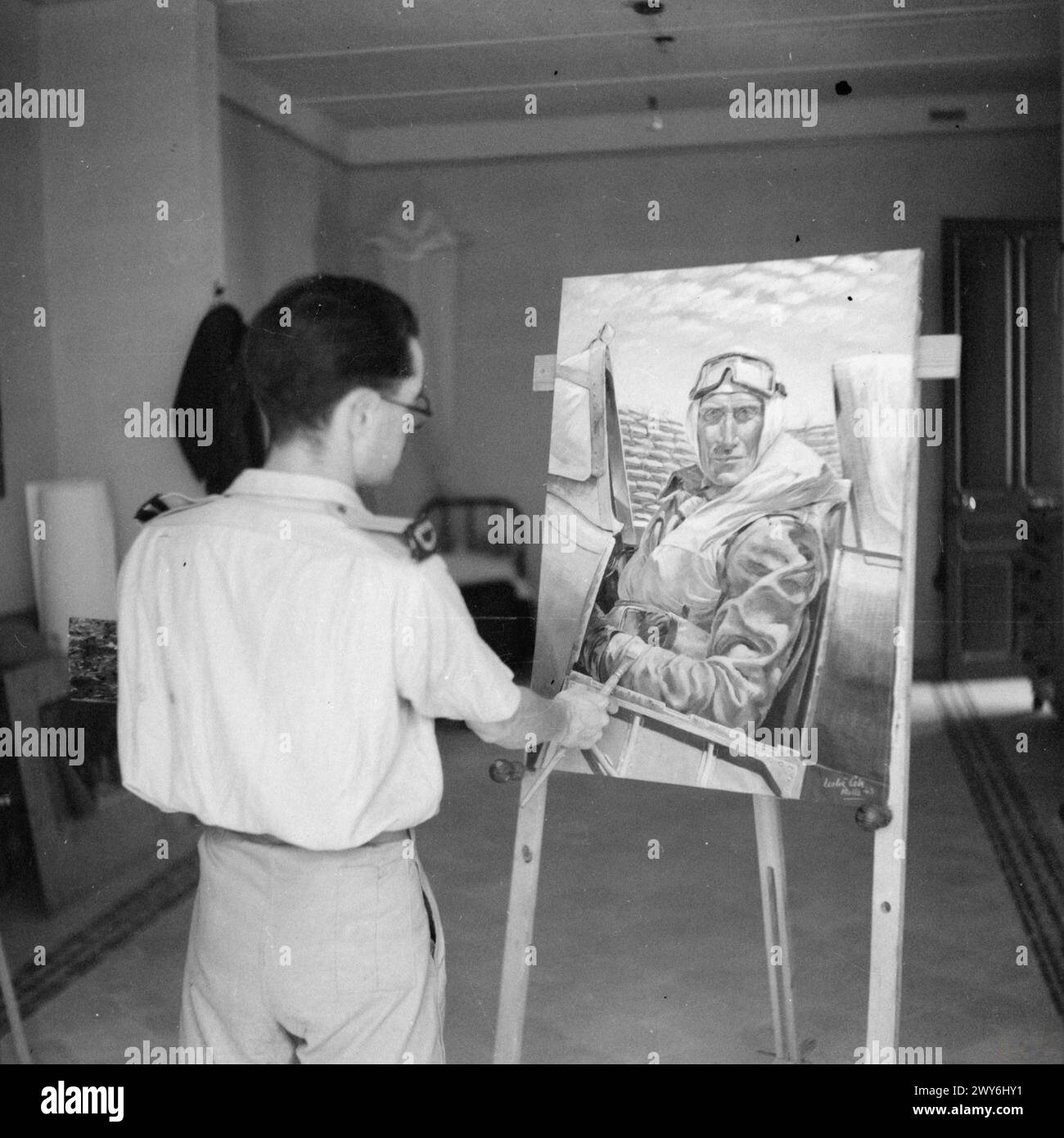 OFFICIAL WAR ARTIST IN MALTA, G.C. - Mr. Leslie Cole putting the ...