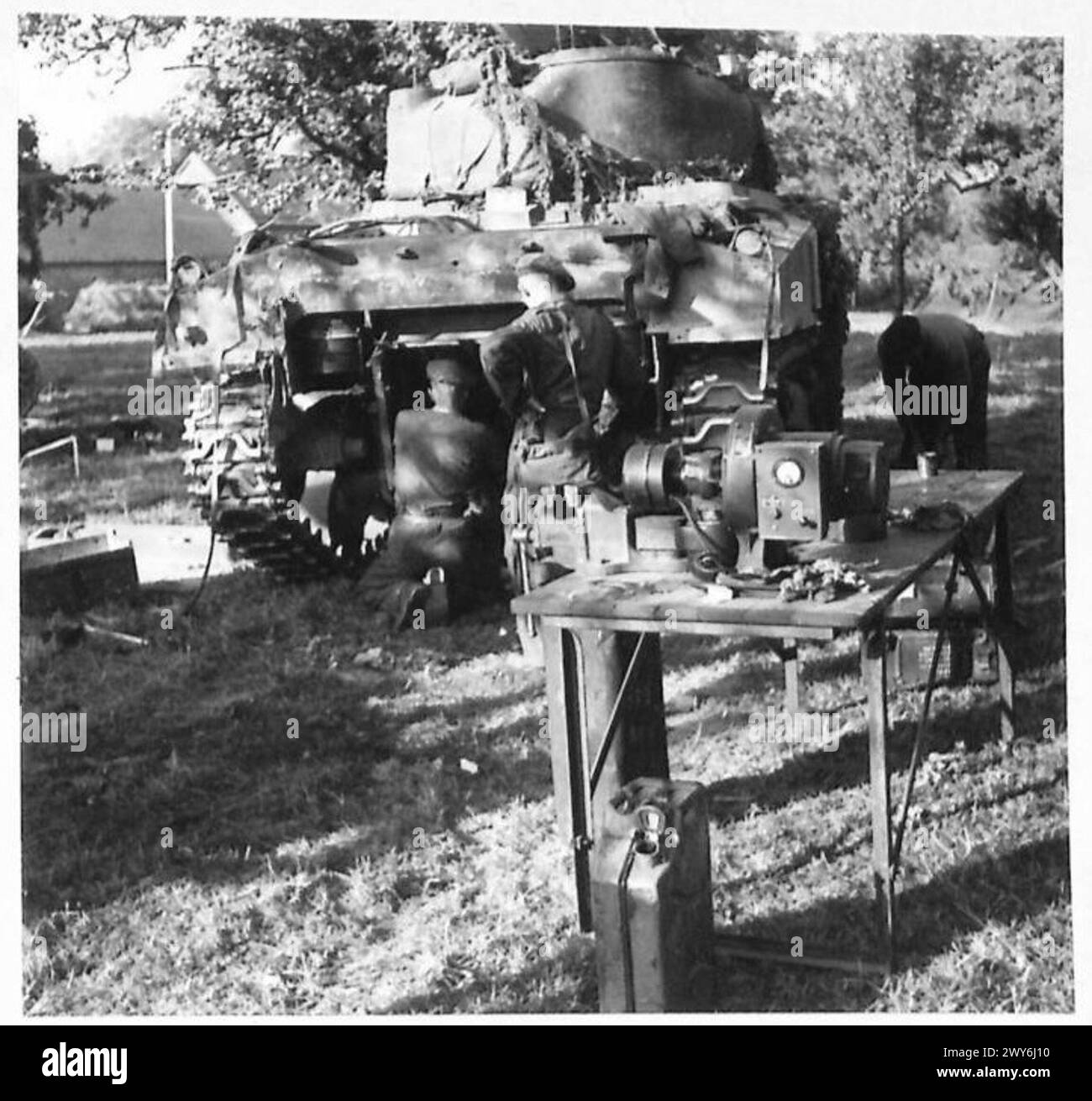 TANK RECOVERY AND REPAIR - Sherman tanks being repaired at a tank ...
