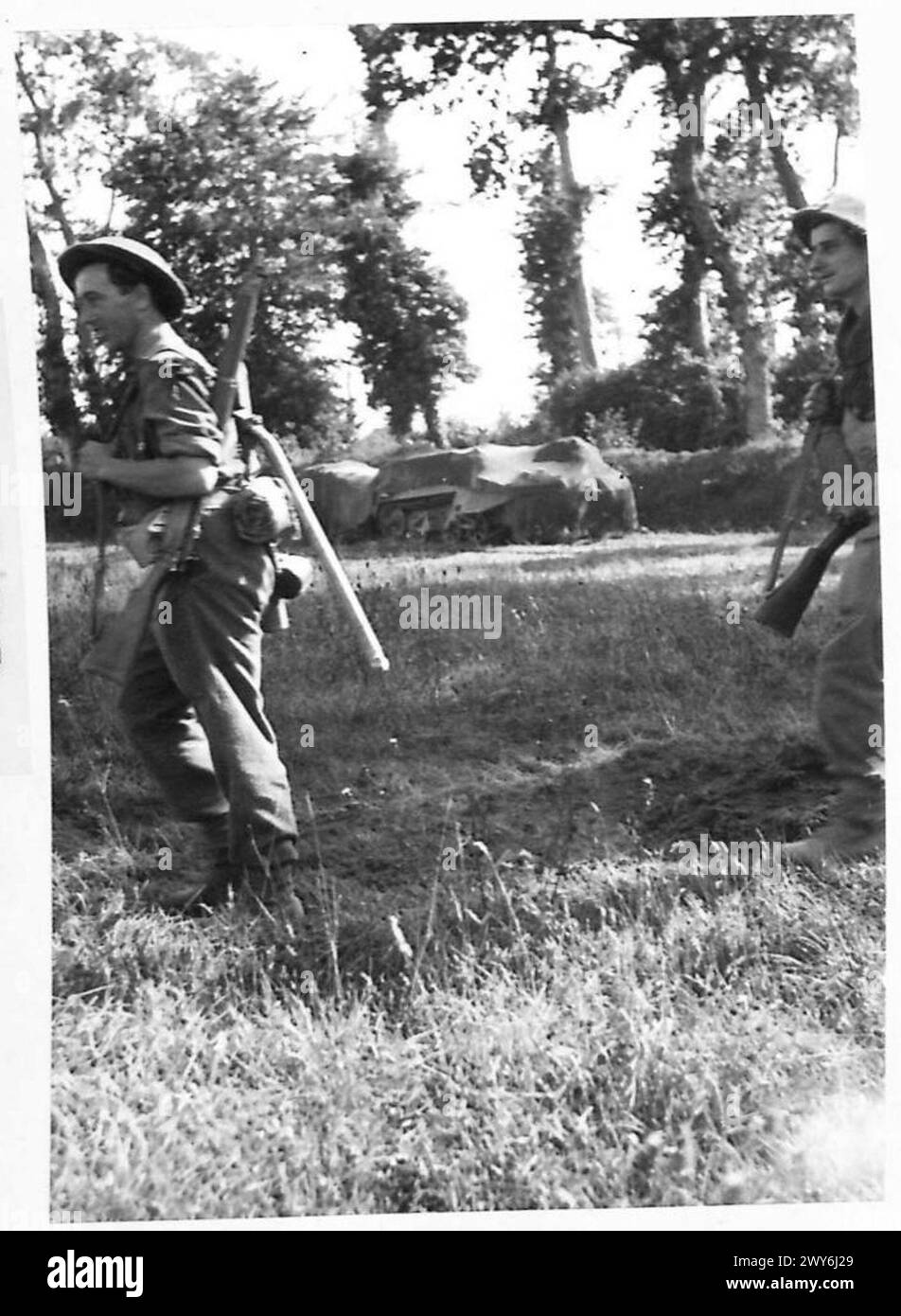 BRITISH INFANTRY MOVE UP - Infantry moving across open fields in ...