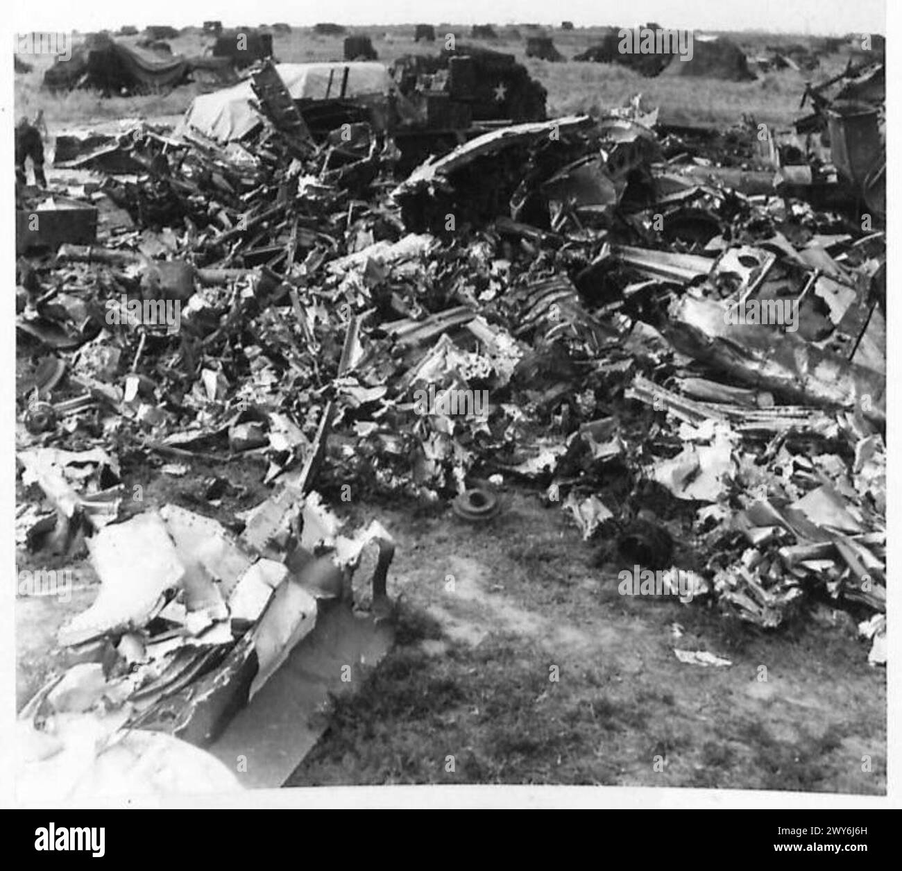 Damaged tanks and vehicles in Normandy are salvaged for metal to be ...