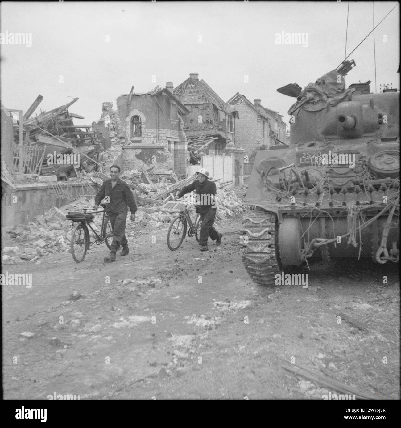 THE BRITISH ARMY IN THE NORMANDY CAMPAIGN 1944 - French civilians pass ...