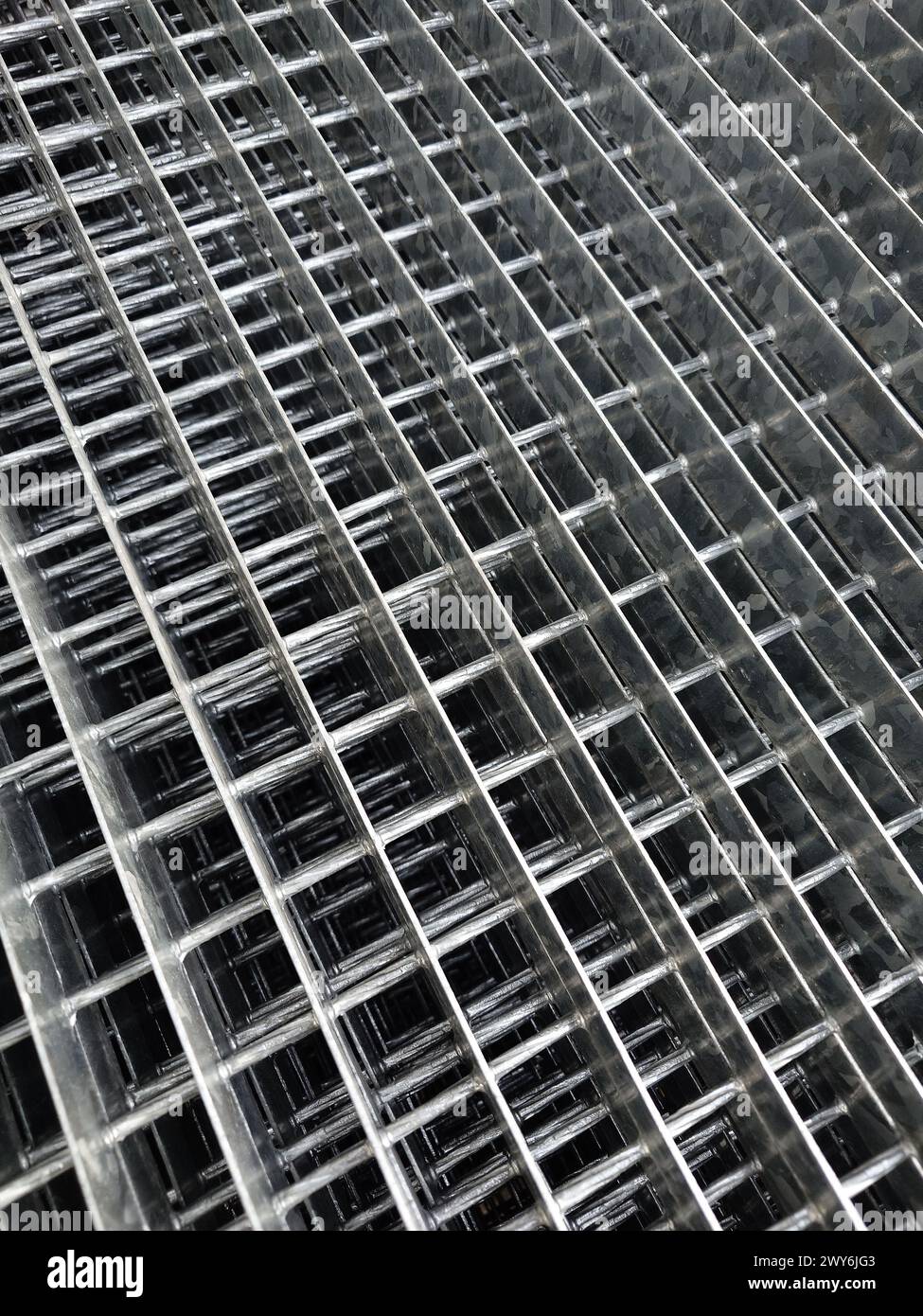 Durable metal grille. Fencing or decking material. Gray industrial ...
