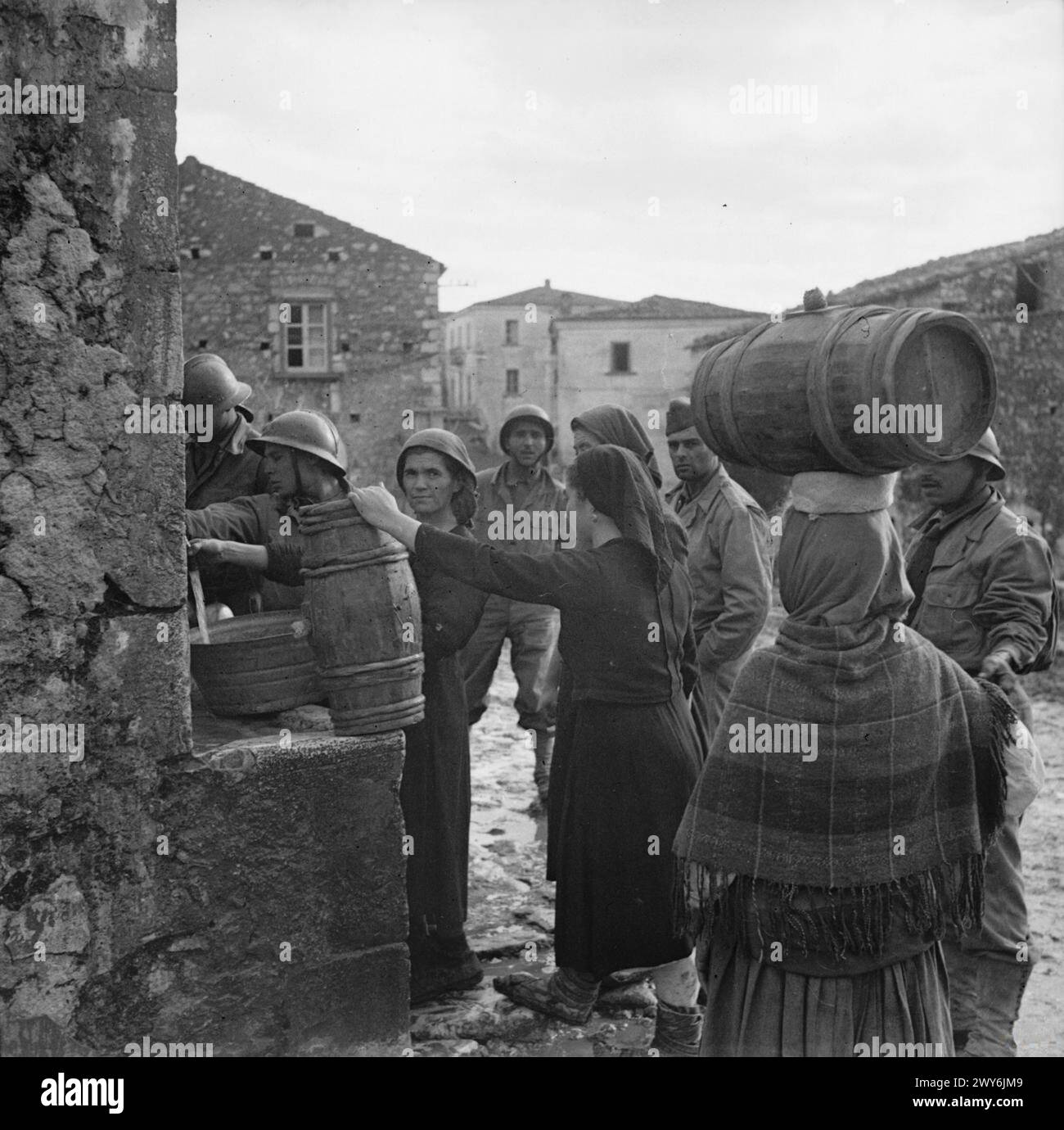 FRENCH TROOPS FIGHTING ON THE FIFTH ARMY FRONT - Stopping to draw water ...