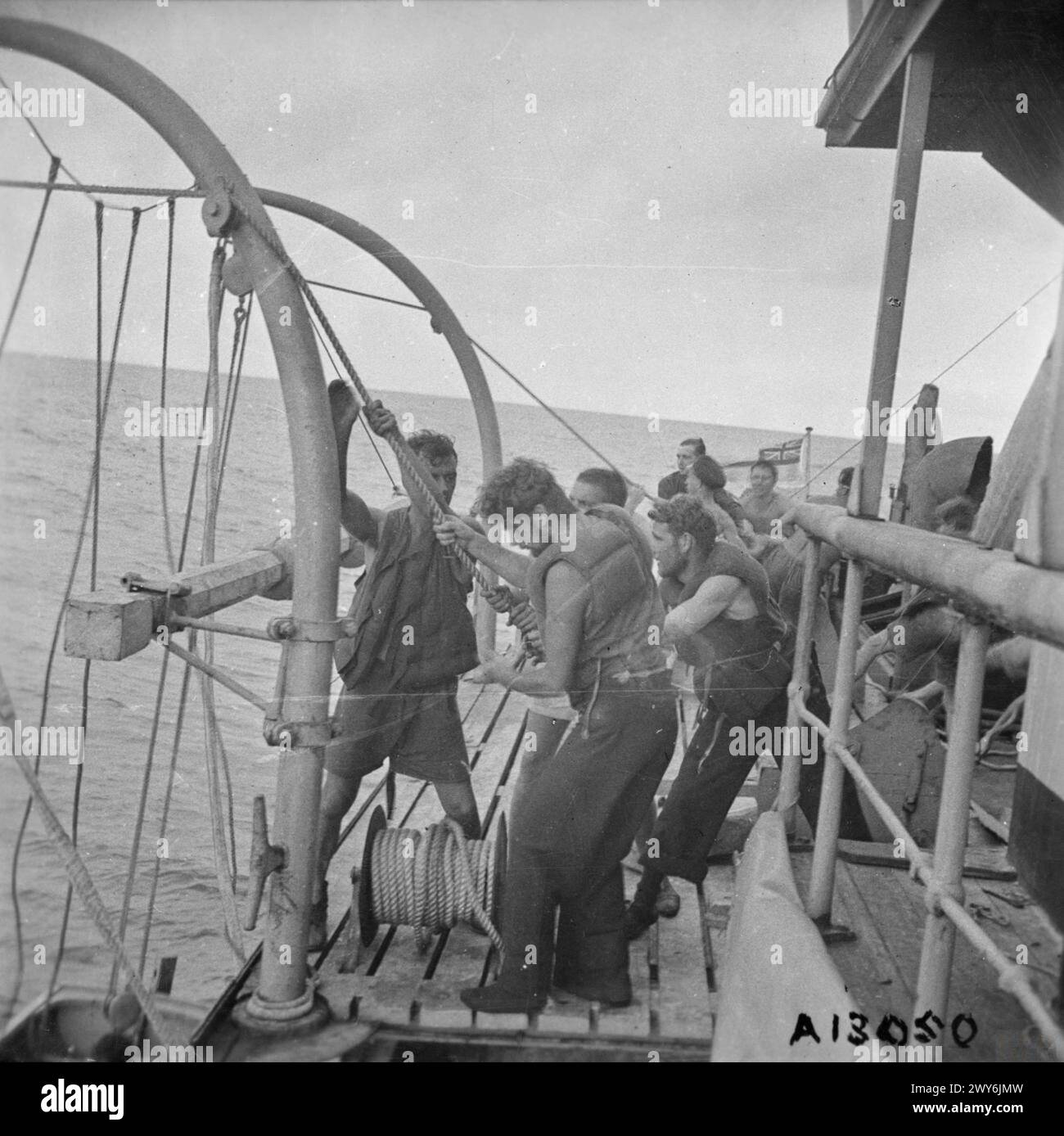 SHIPWRECKED BRITISH SEAMEN SAVED BY S O S IN THE SAND. 4 DECEMBER 1942 ...