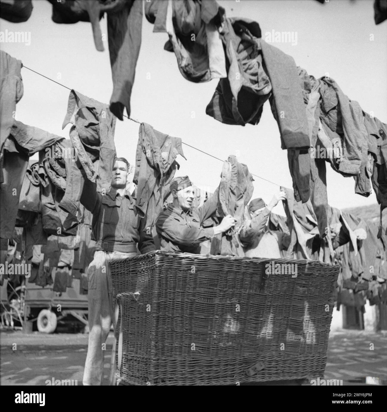 In Italy in December 1943, men of the No. 11 and No. 14 Mobile Laundry ...