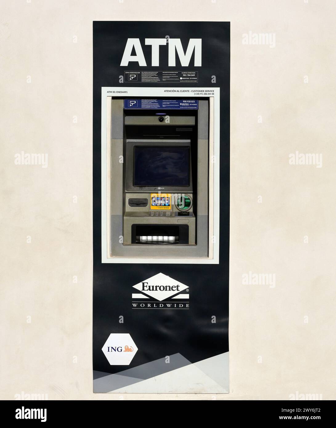 ATM cash machine, in a whitewashed wall, El Cotillo, Fuerteventura ...