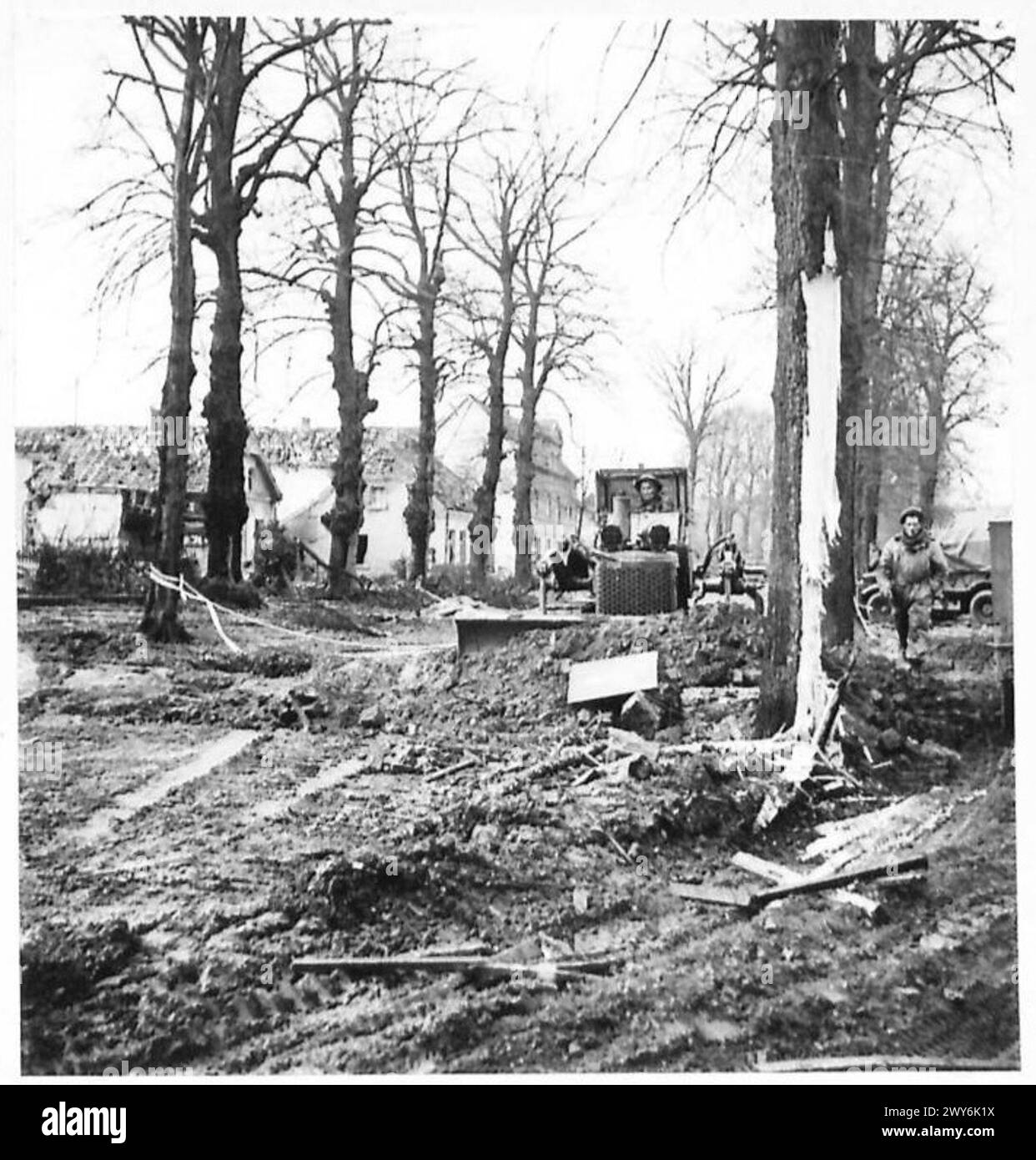 British troops are stationed in Kleve, Germany, with a bulldozer ...