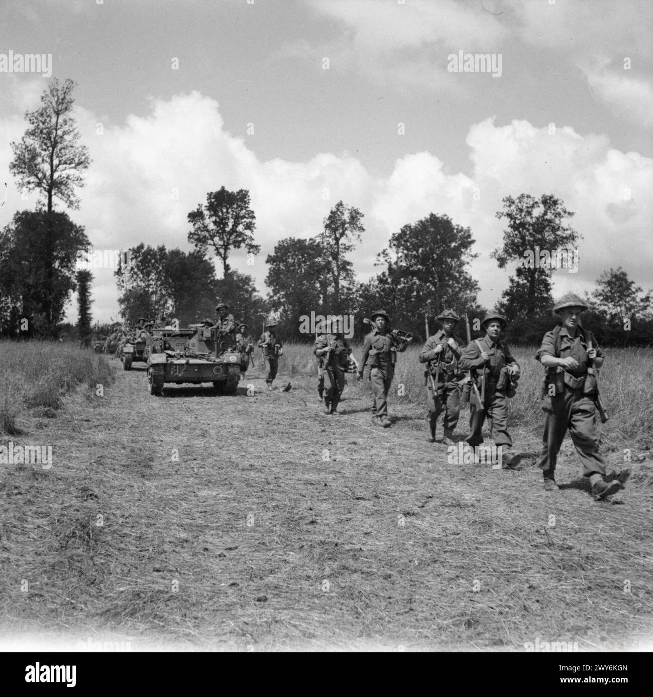 THE BRITISH ARMY IN NORMANDY 1944 - Universal carriers and infantry of ...
