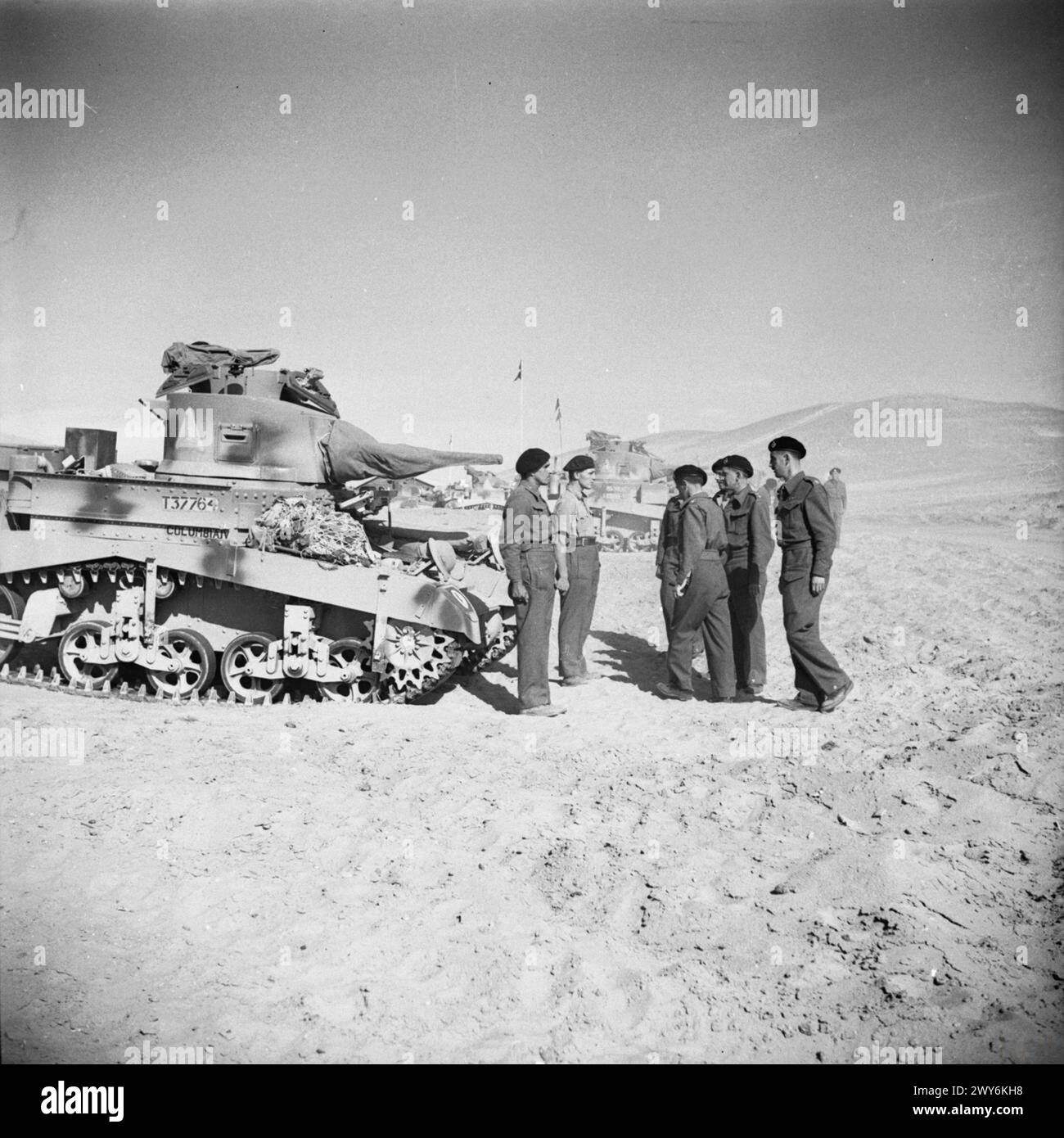 THE BRITISH ARMY IN THE MIDDLE EAST 1942 - Stuart tanks and crews lined ...