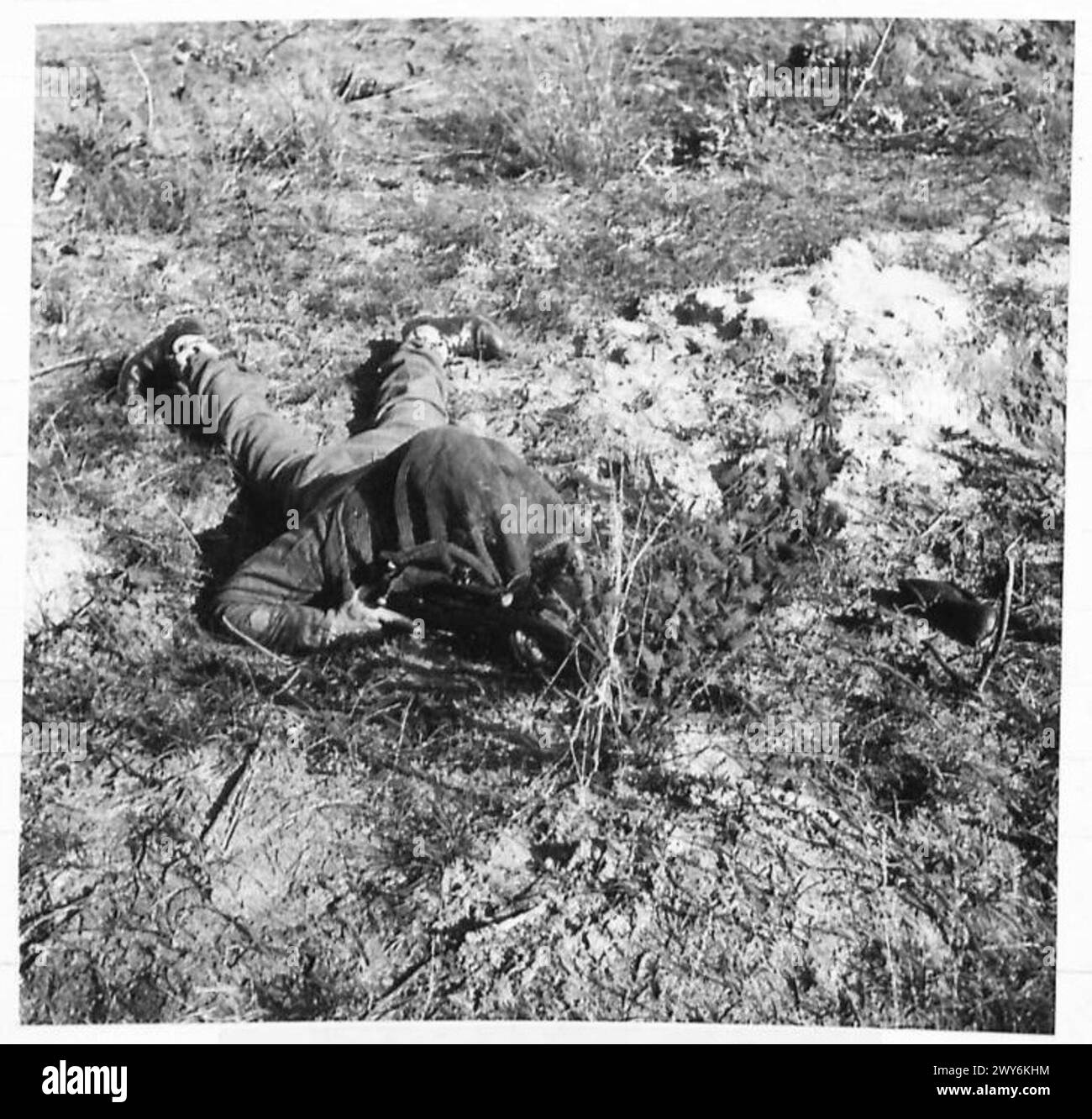 A sniper demonstrates camouflage techniques using a personal screen and ...