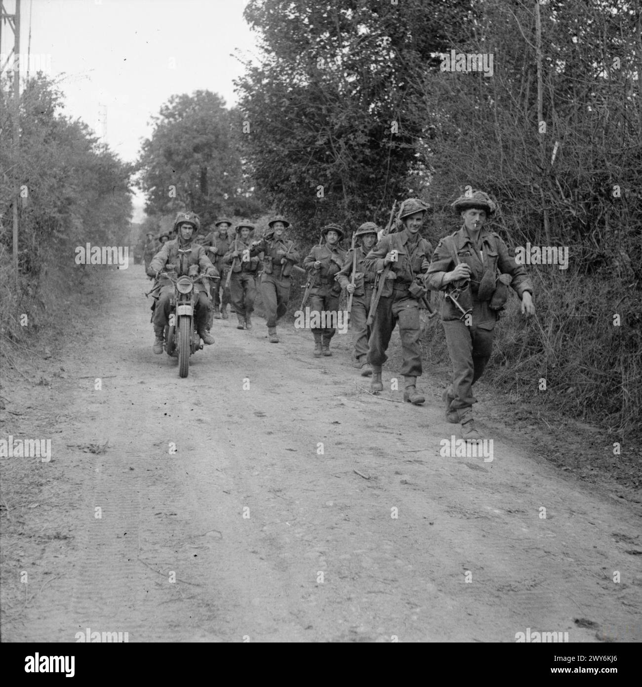 THE BRITISH ARMY IN THE NORMANDY CAMPAIGN 1944 - A motorcycle and ...