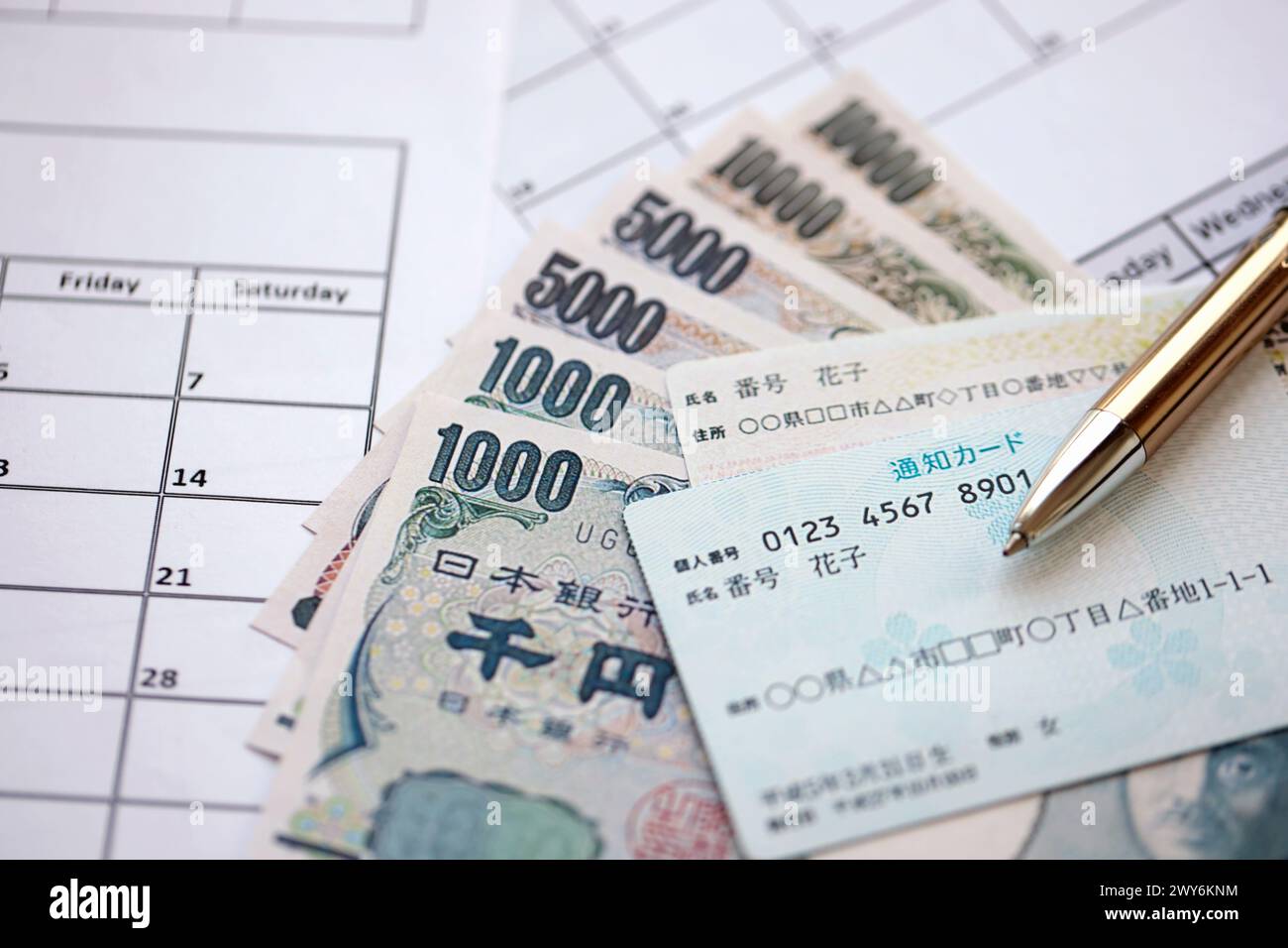 Japanese my number card specimen and notification card on calendar ...