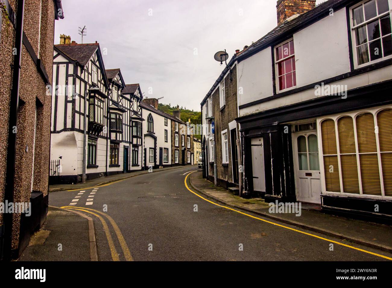 Deserted Road winding through the Victorian Aged houses of the Welsh ...