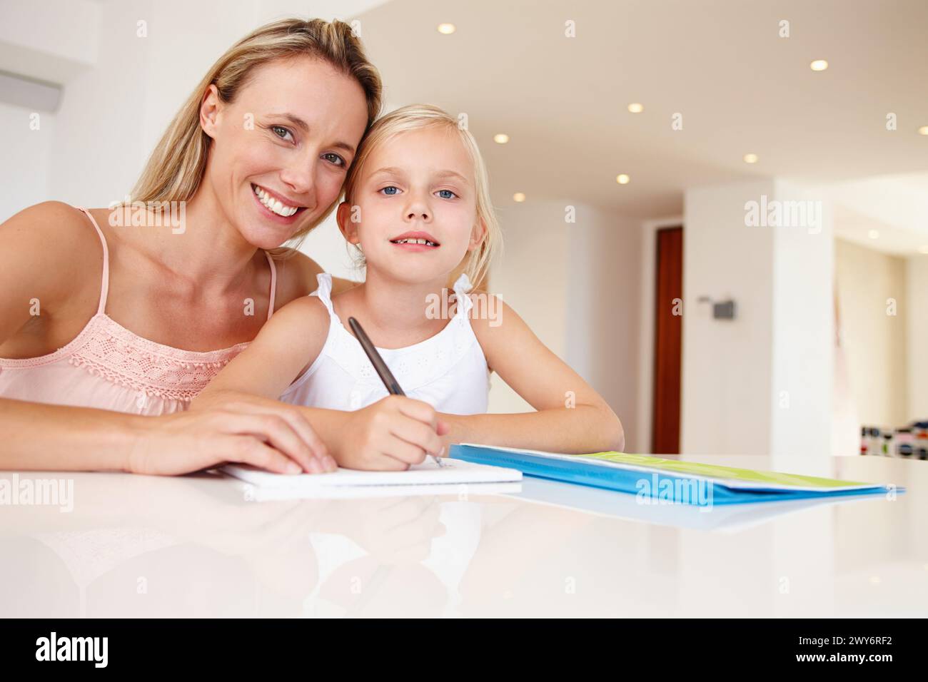Mom, teaching and child smiling in portrait for after school learning ...