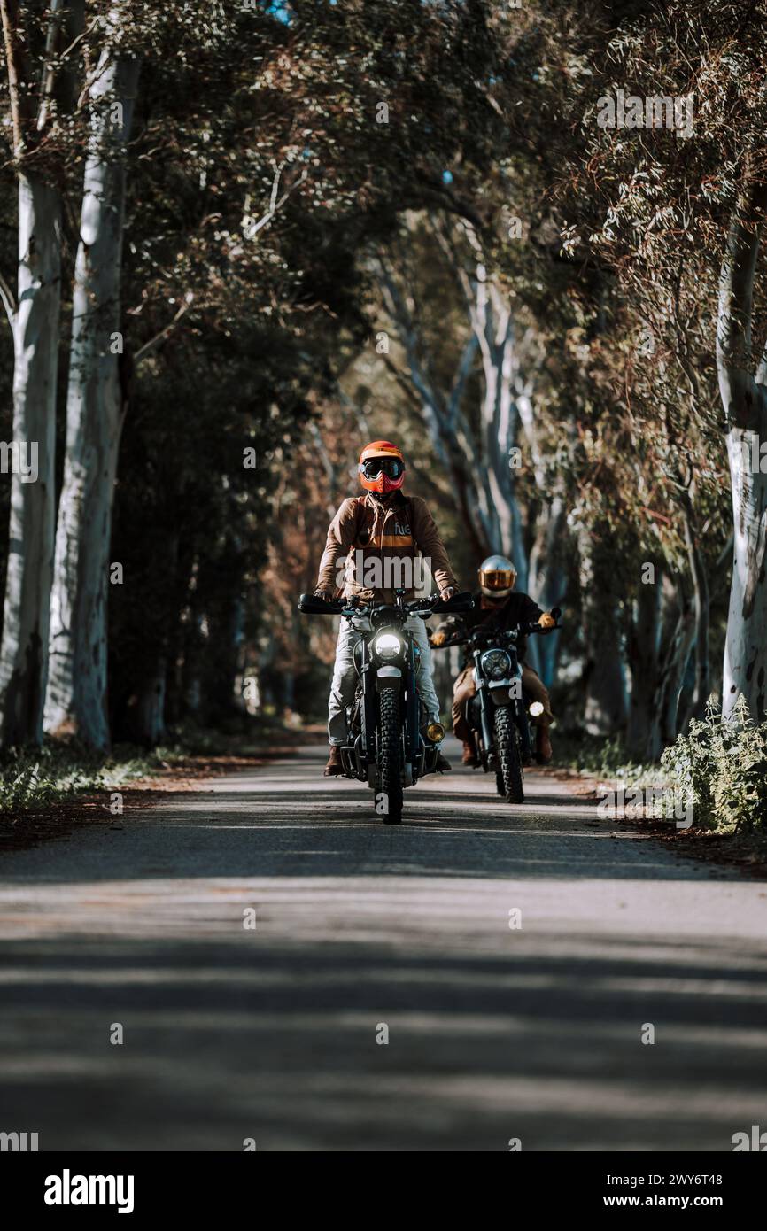 Group motorcyclists cruising on scenic hi-res stock photography and ...