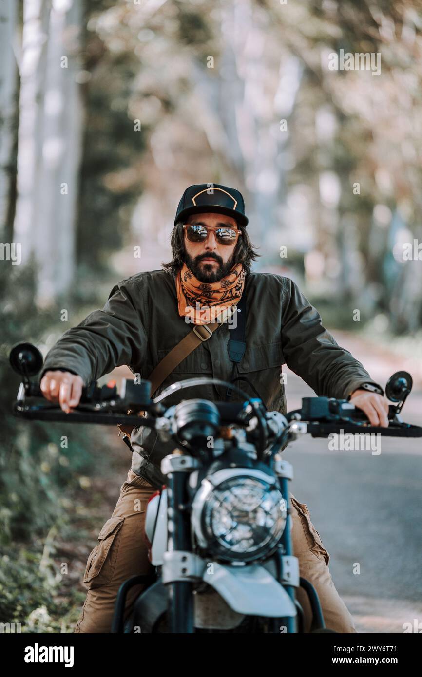 Man on motorcycle wearing leather jacket hi-res stock photography and ...