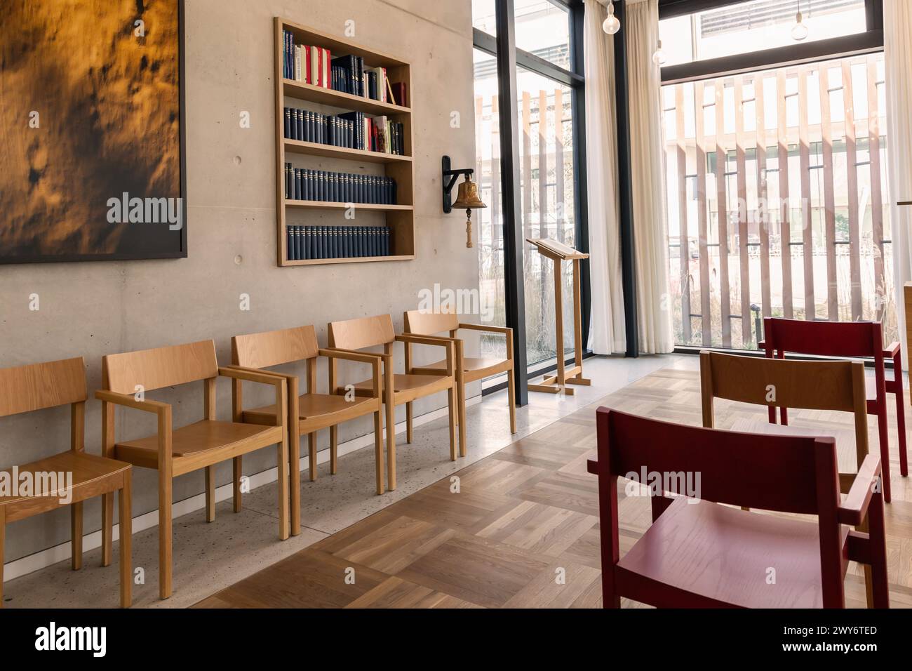 Church room for prayer and privacy with a large cross and chairs for ...