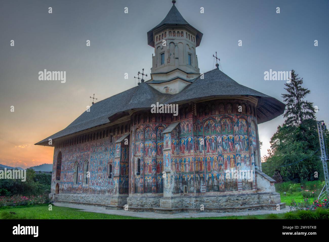 Sunset at the Moldovita monastery in Romania Stock Photo - Alamy