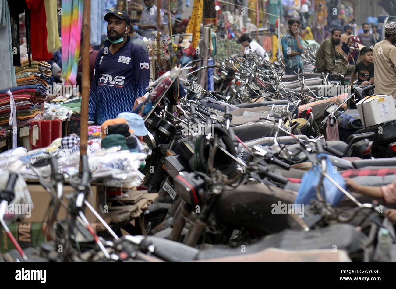View of illegal encroachment by parking on a road by influent parking ...