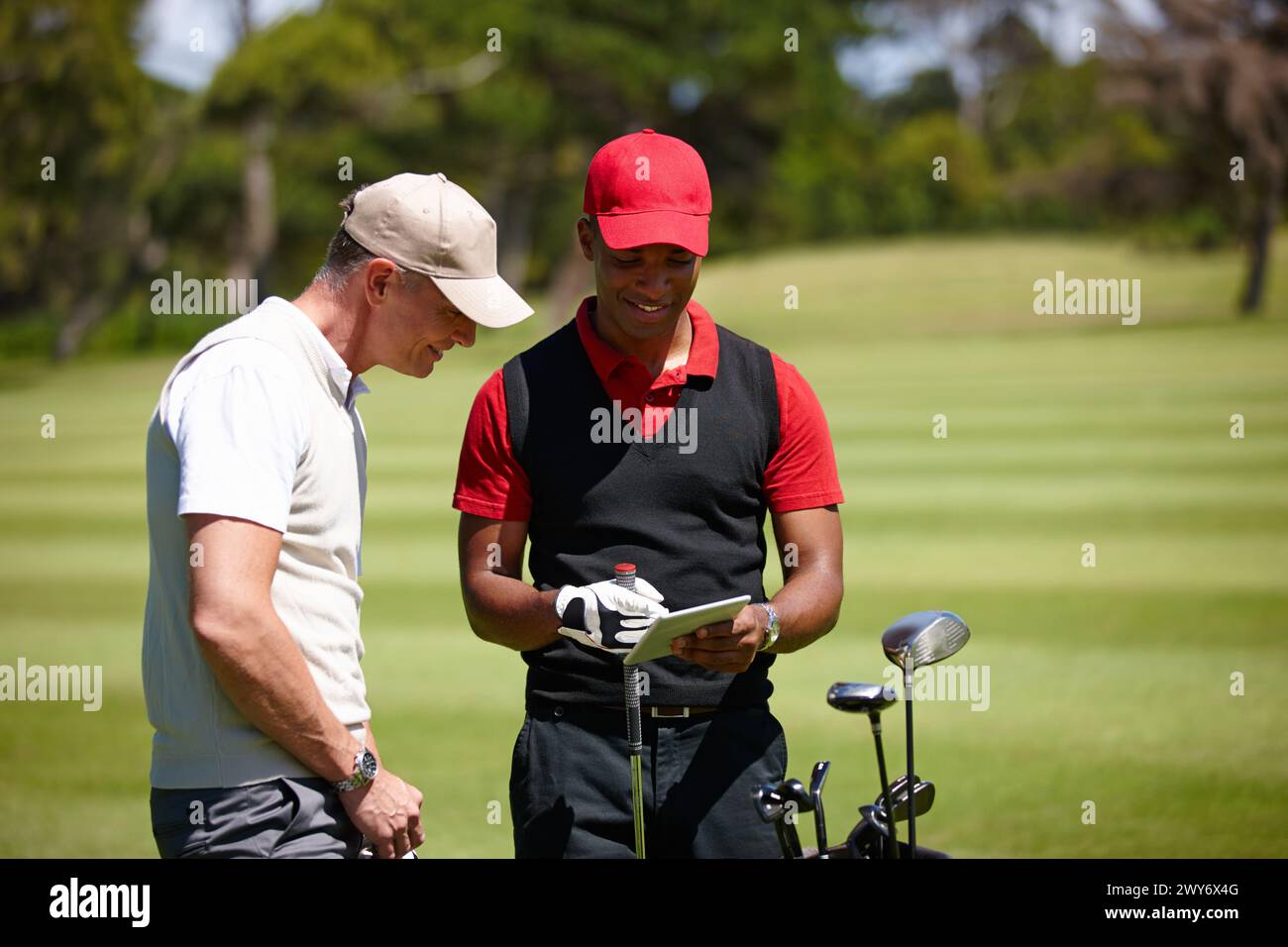 Golf course, people and technology on field talking from personal ...