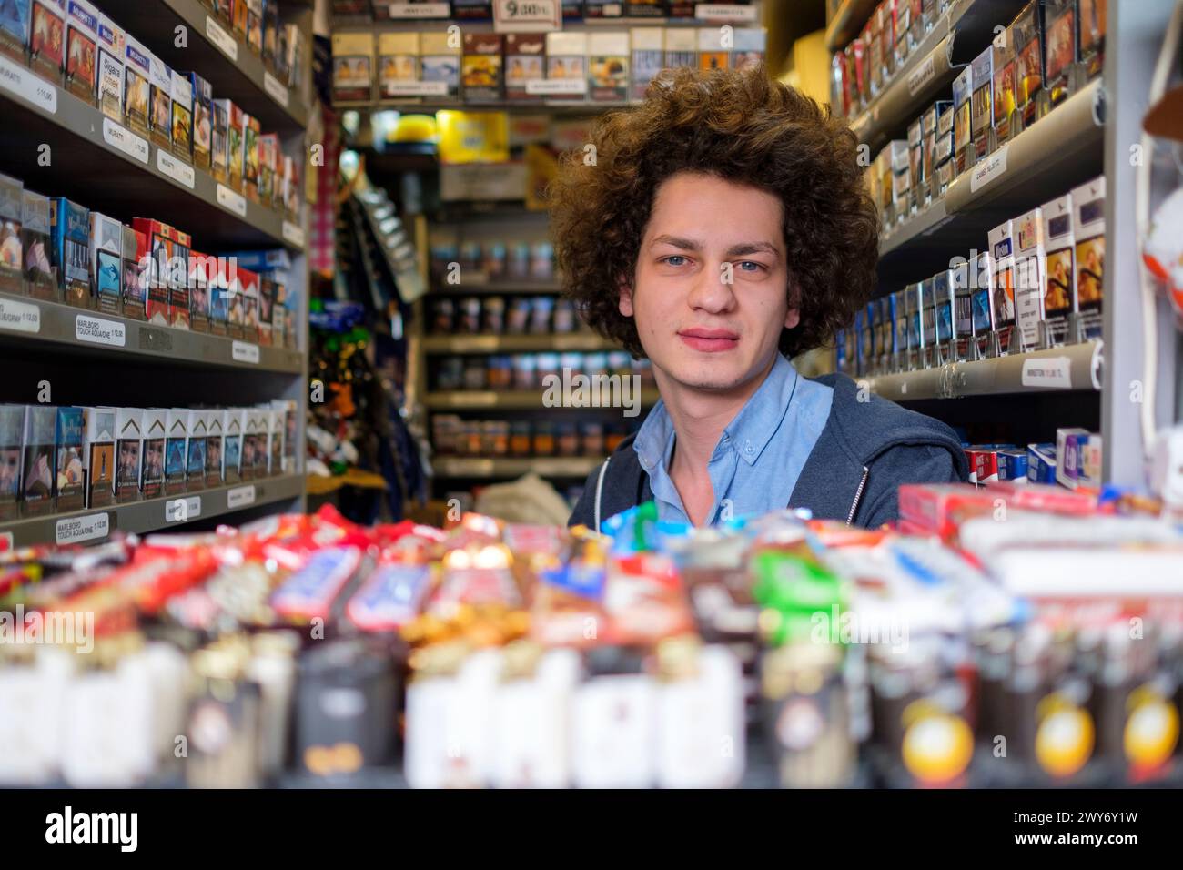 A tobacco kiosk and salesman in Istiklal Street serve smokers. Since ...