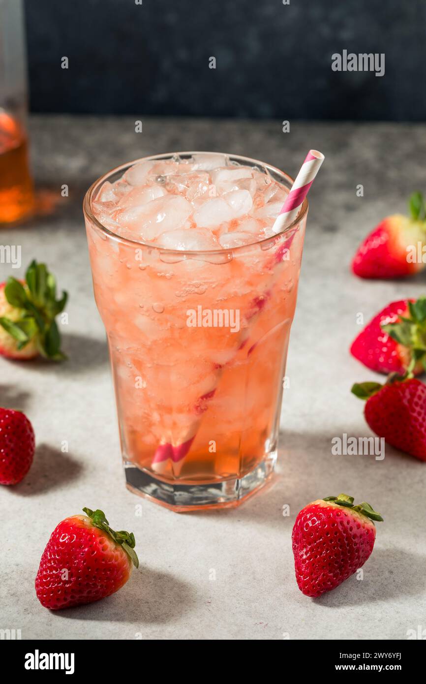 Cold Refreshing Strawberry Soda with Ice and a Straw Stock Photo - Alamy