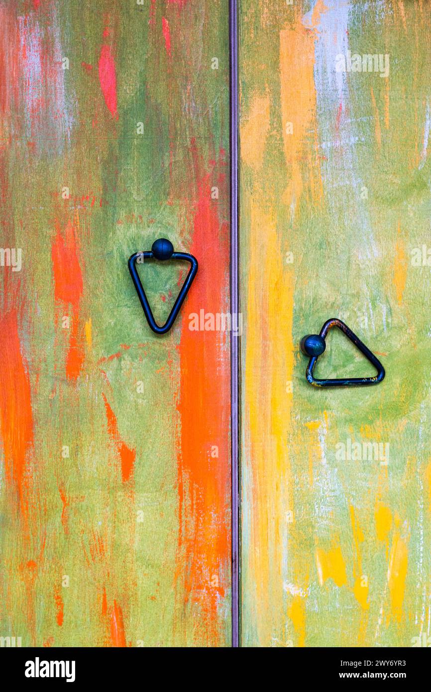 Back view of green wooden cabinet with two black handles Stock Photo ...