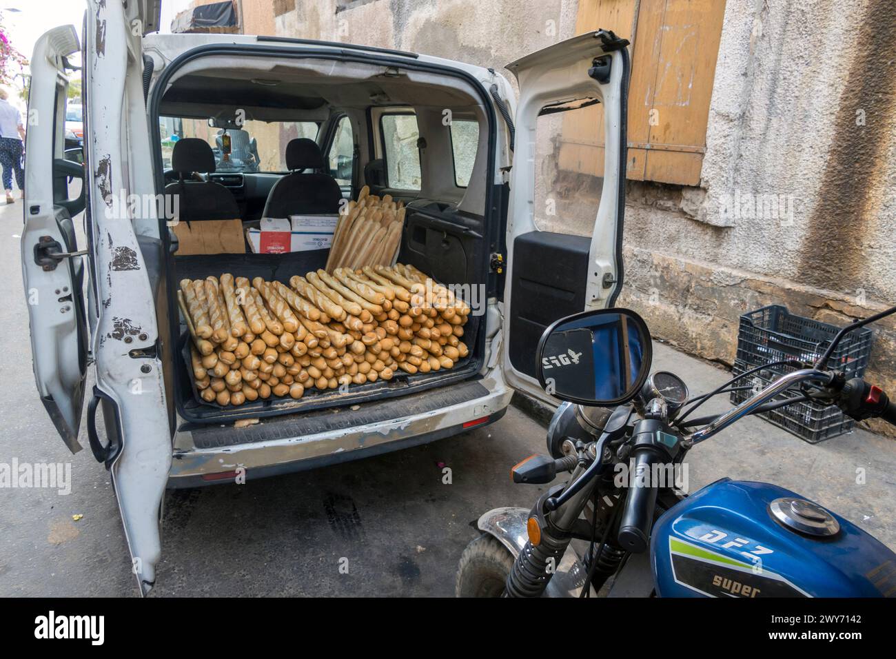 West Africa, Senegal, Saint Louis. A delivery van full of baguettes ...