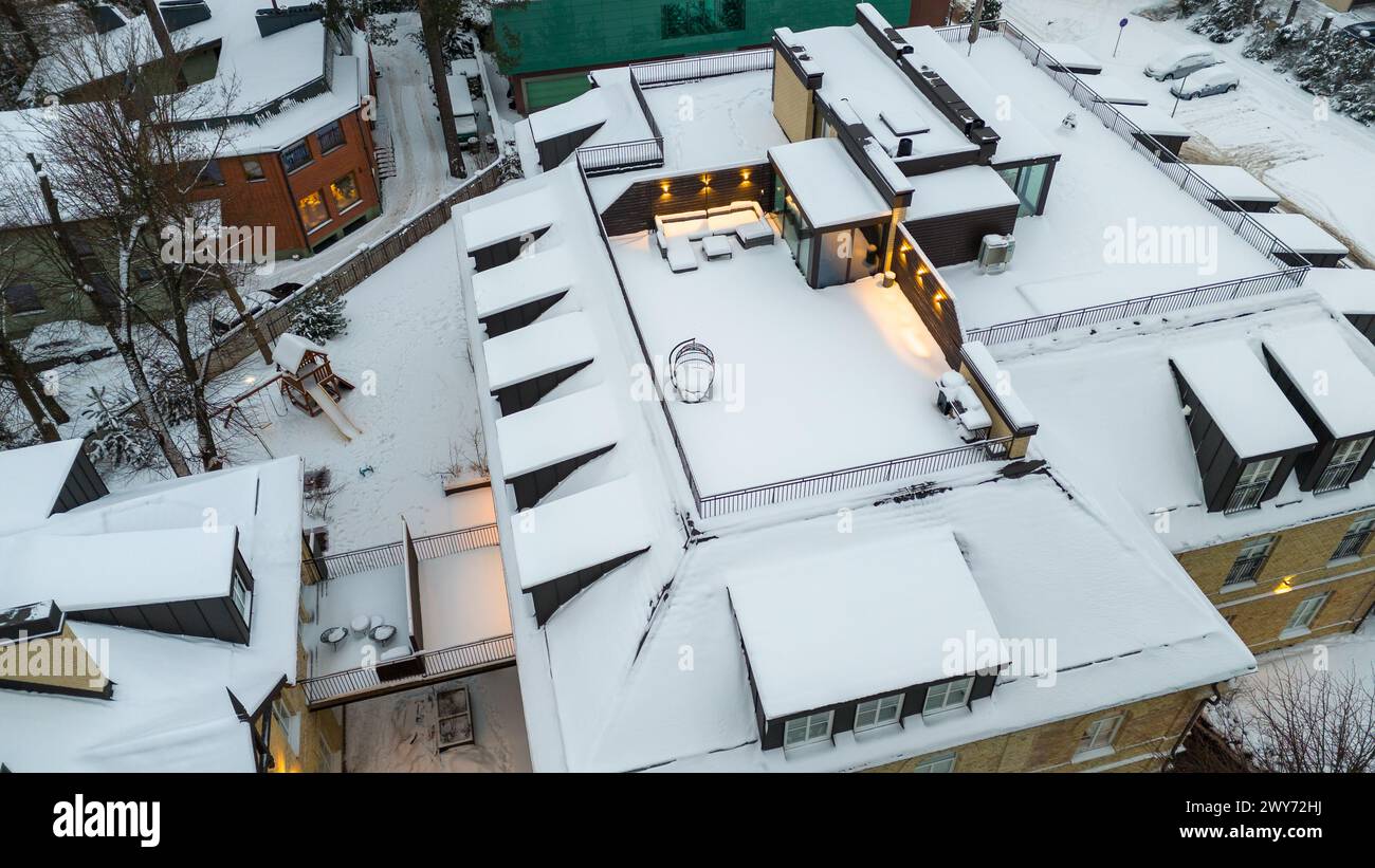 Drone photography of rooftop terrace covered by snow during winter ...