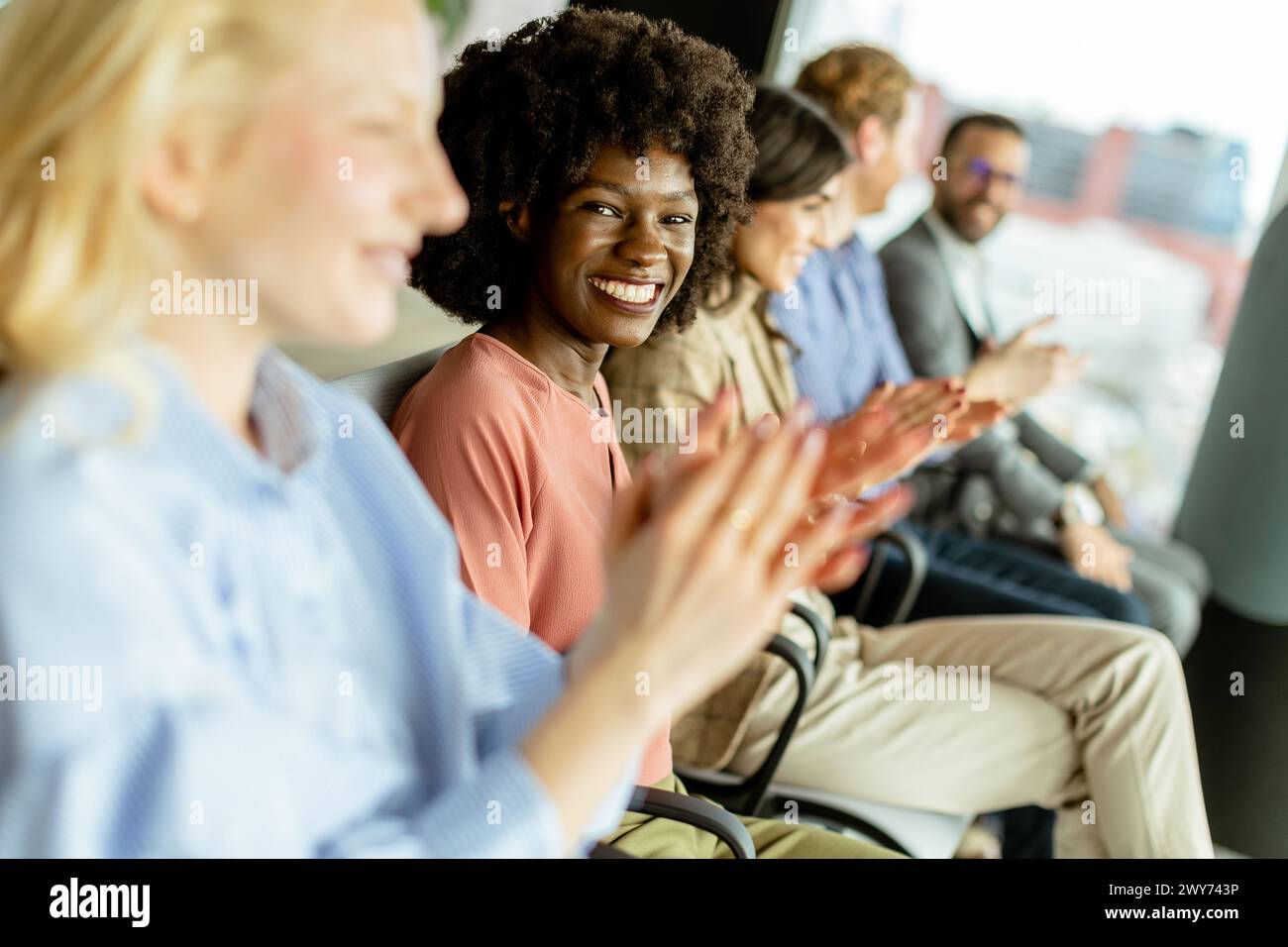 Woman applause group celebration hi-res stock photography and images ...